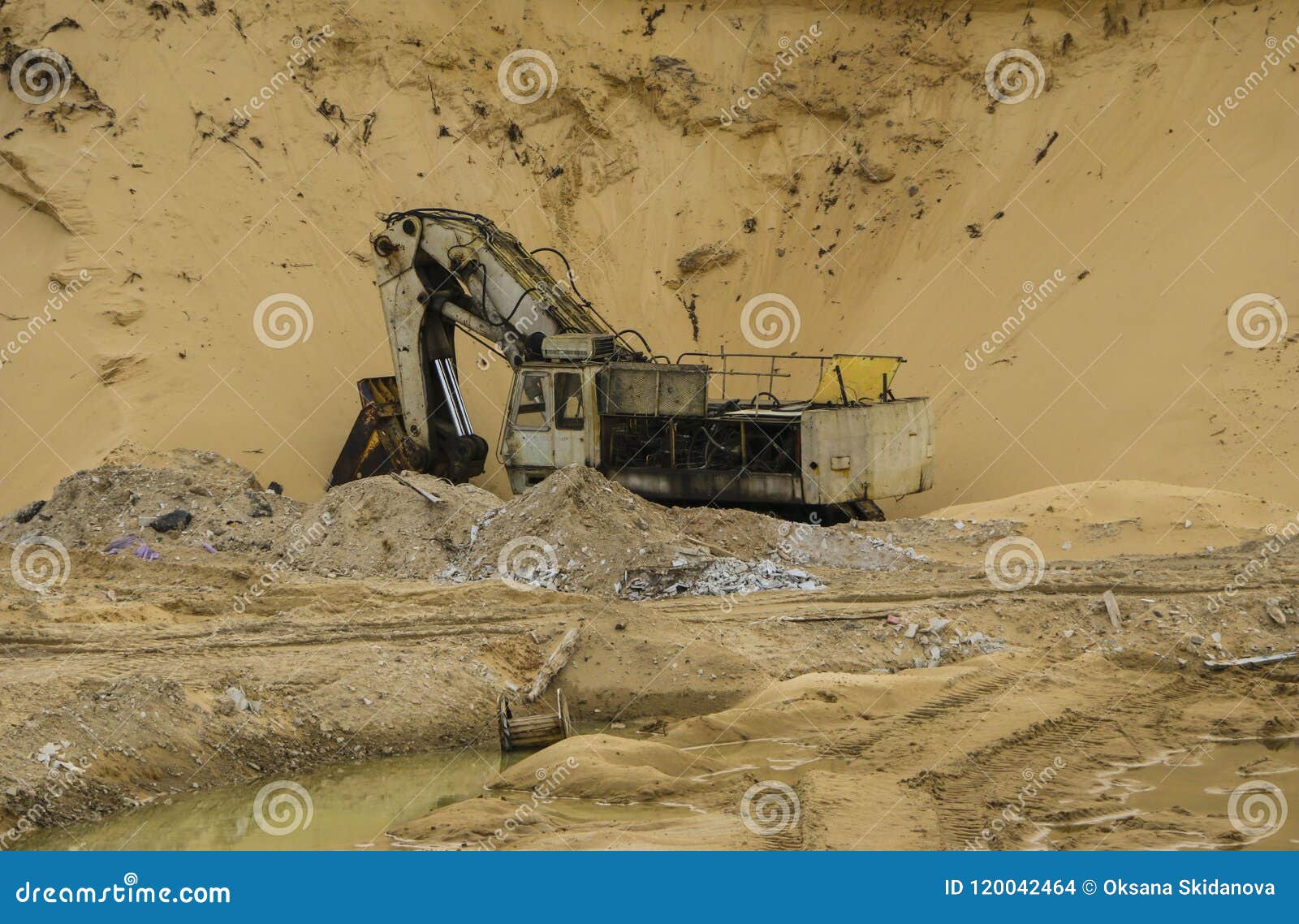 Excavators at a Sand Quarry. Big Orange Digger in Open Sand Mine is ...