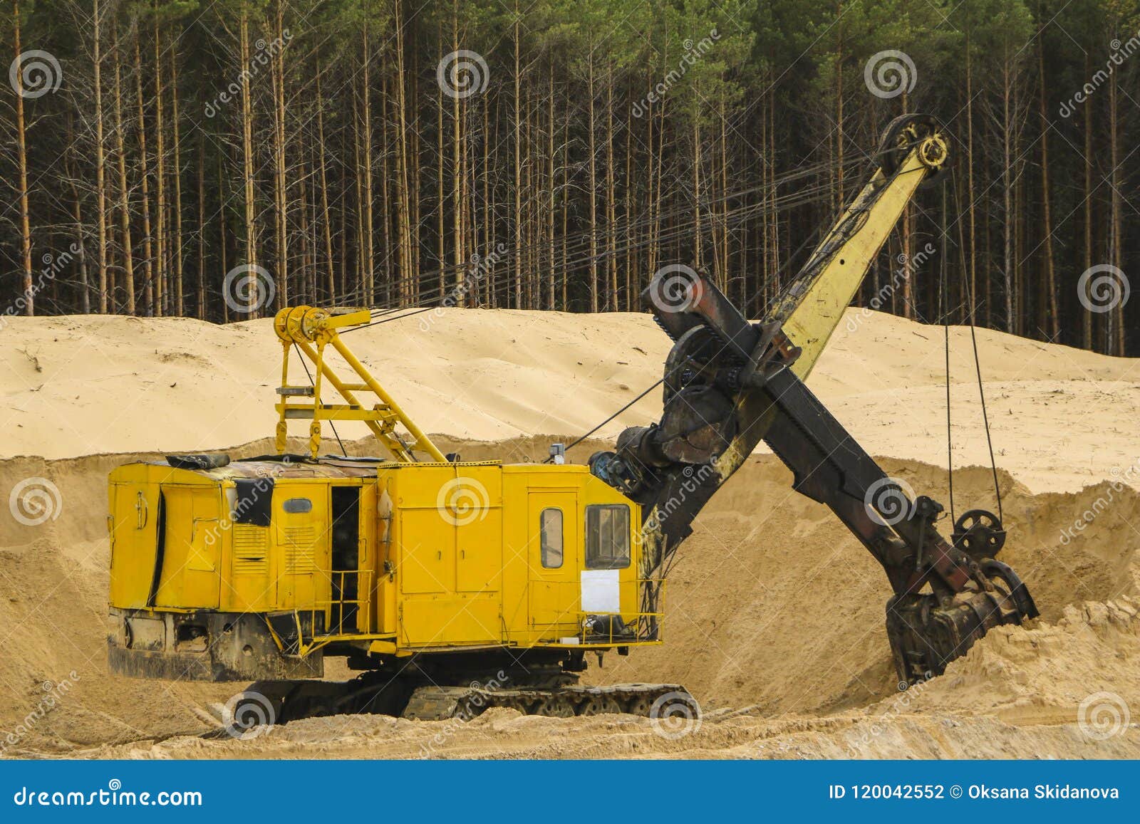Excavators at a Sand Quarry. Big Orange Digger in Open Sand Mine is ...