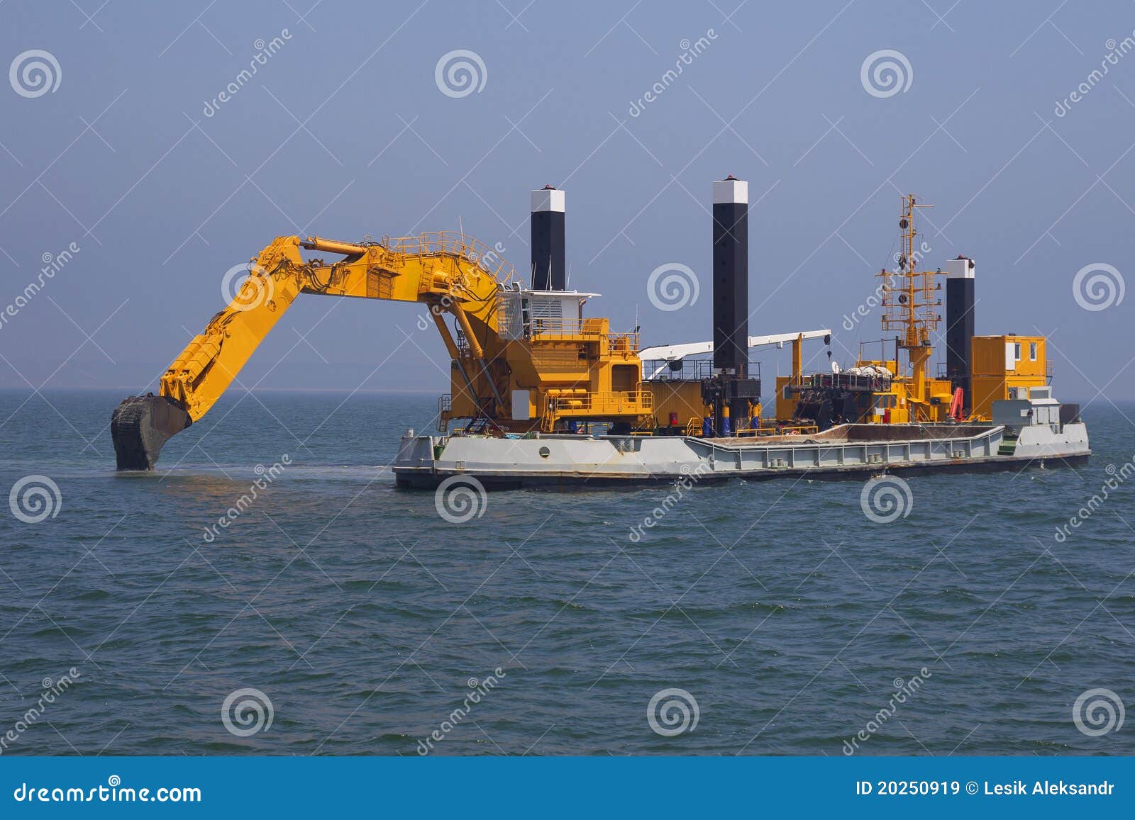Excavators set out to sea stock image. Image of teeth - 20250919