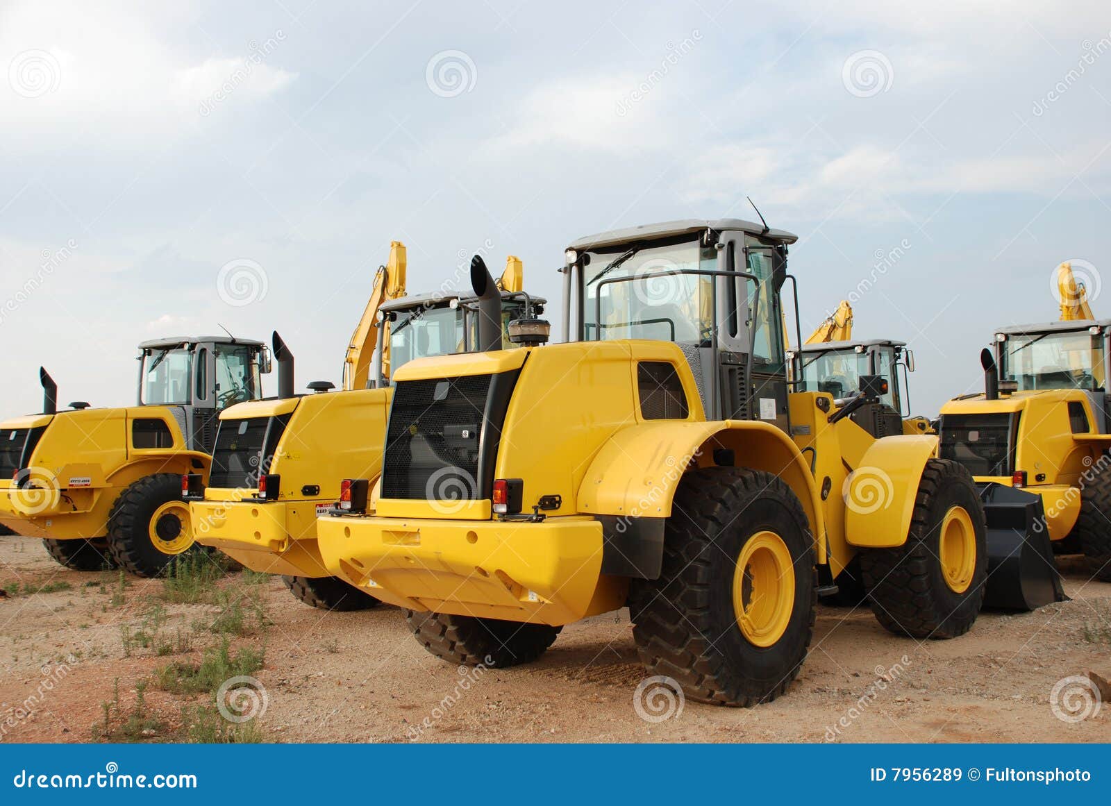 Excavators in stock yard stock image. Image of mechanical - 7956289