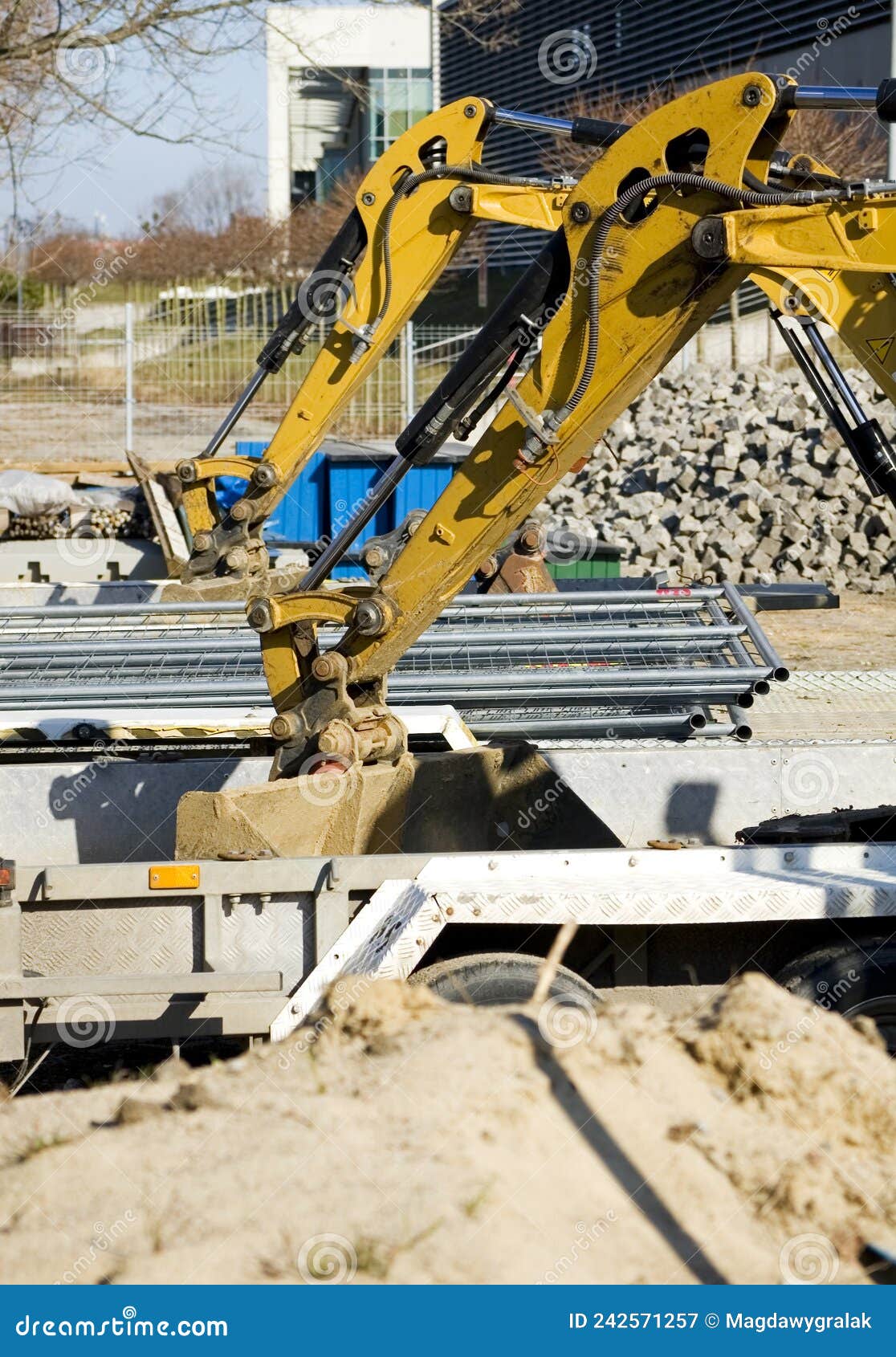Excavators Working At Construction Site On Earthworks. Backhoe Digging ...