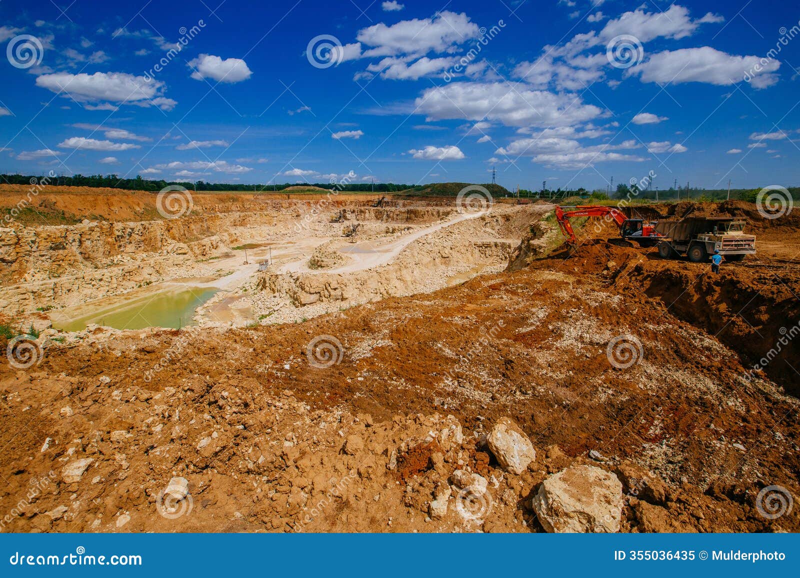 Excavators Working on Limestone Mining in the Quarry Stock Image ...