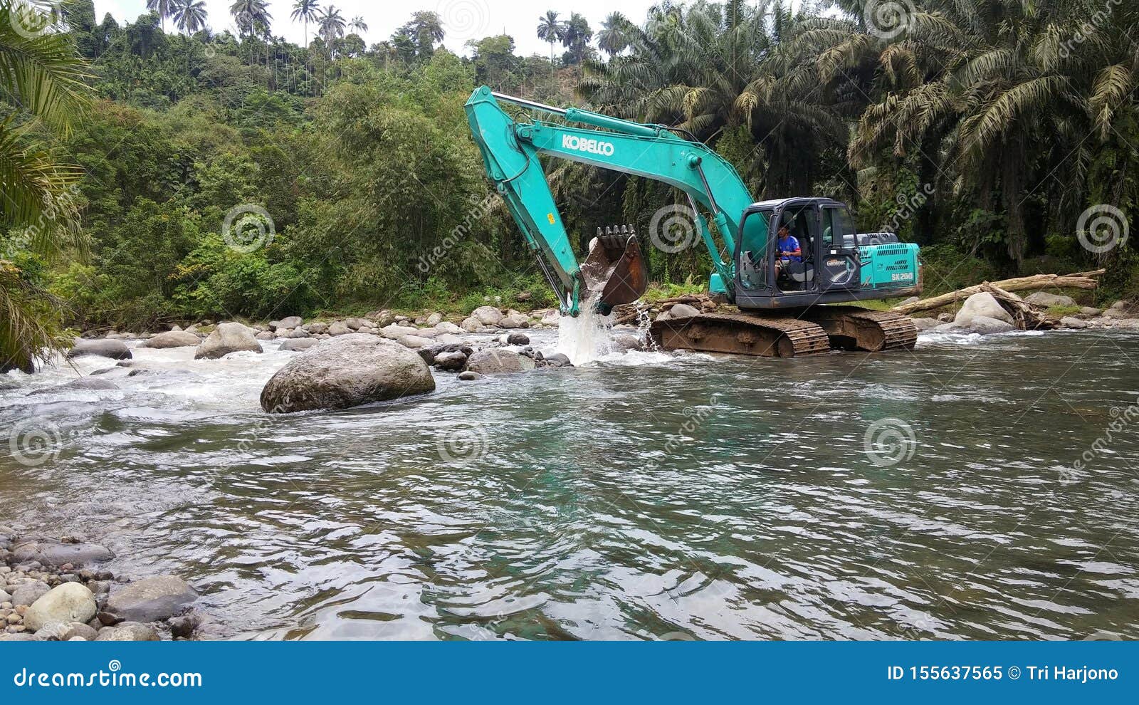 Excavators are Working in the Middle of the River. Editorial Image ...