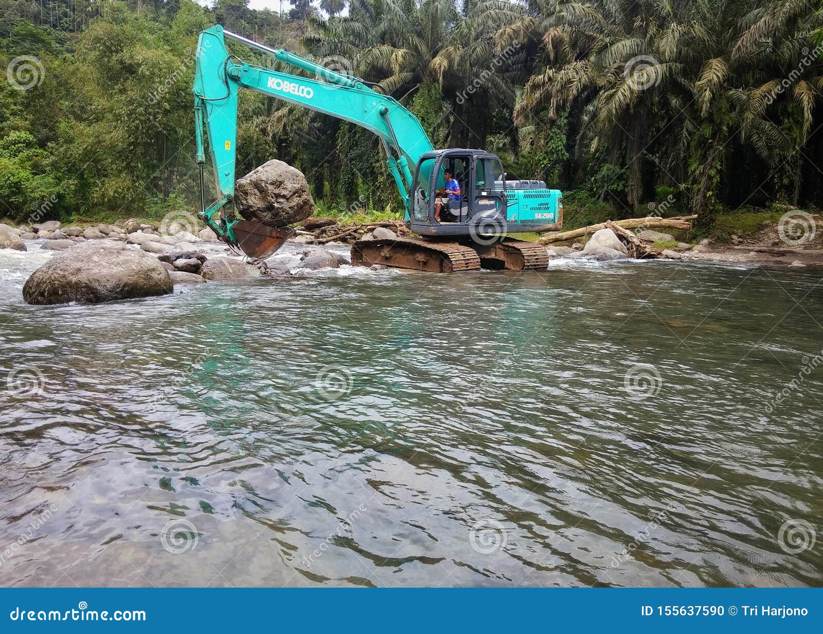 Excavators are Working in the Middle of the River. Editorial Image ...