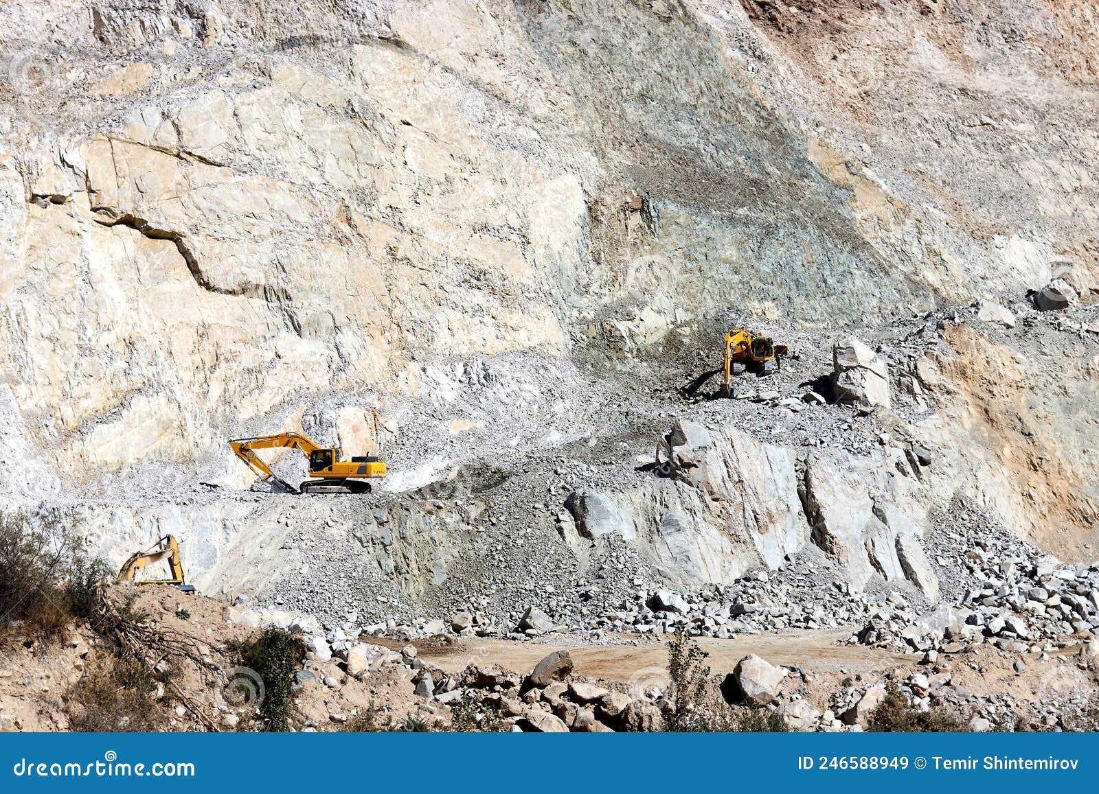 Excavators Working on the Slope of the Cliff Stock Image - Image of ...