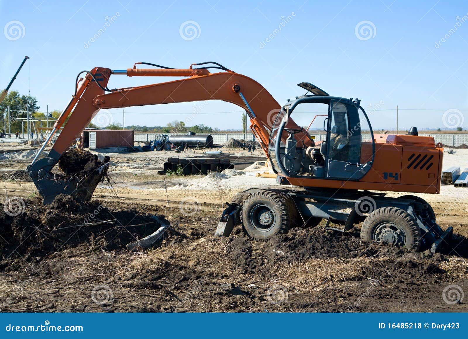 Excavatrice photo stock. Image du industrie, bleu, godet - 16485218