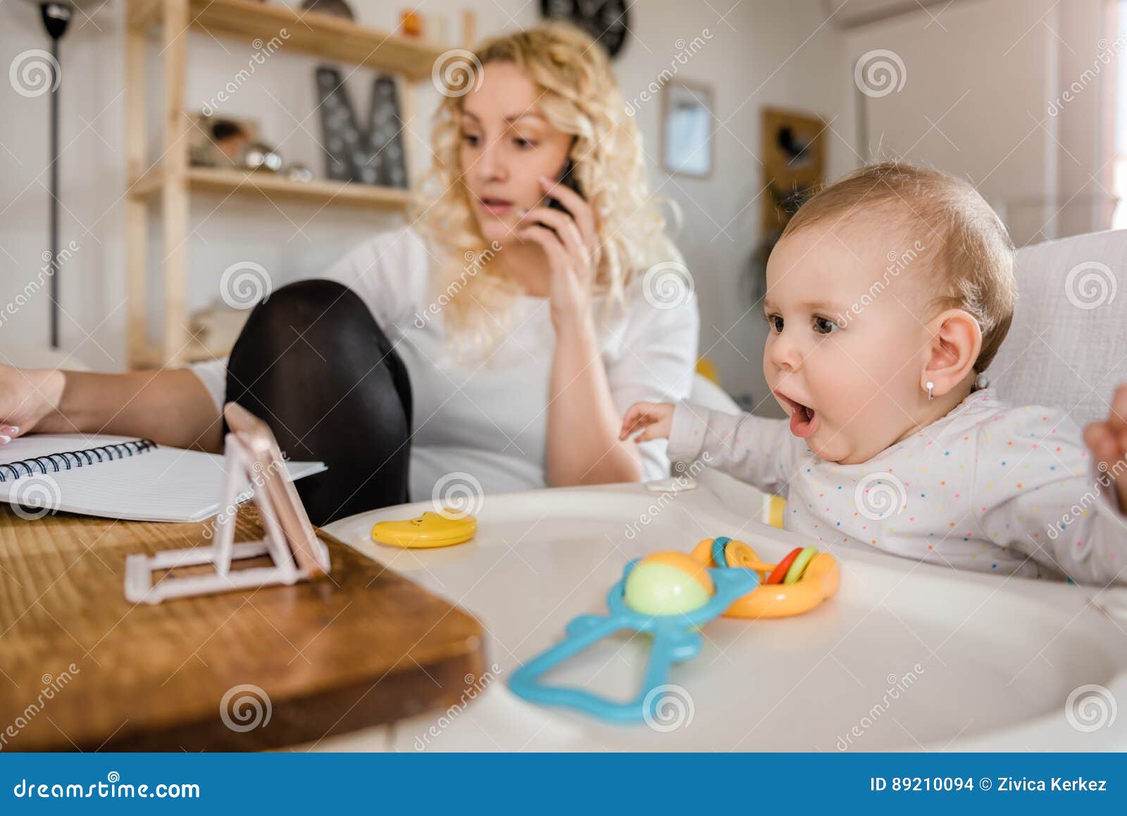 Excited Baby Watching Smart Phone Stock Photo - Image of indoors, hair ...