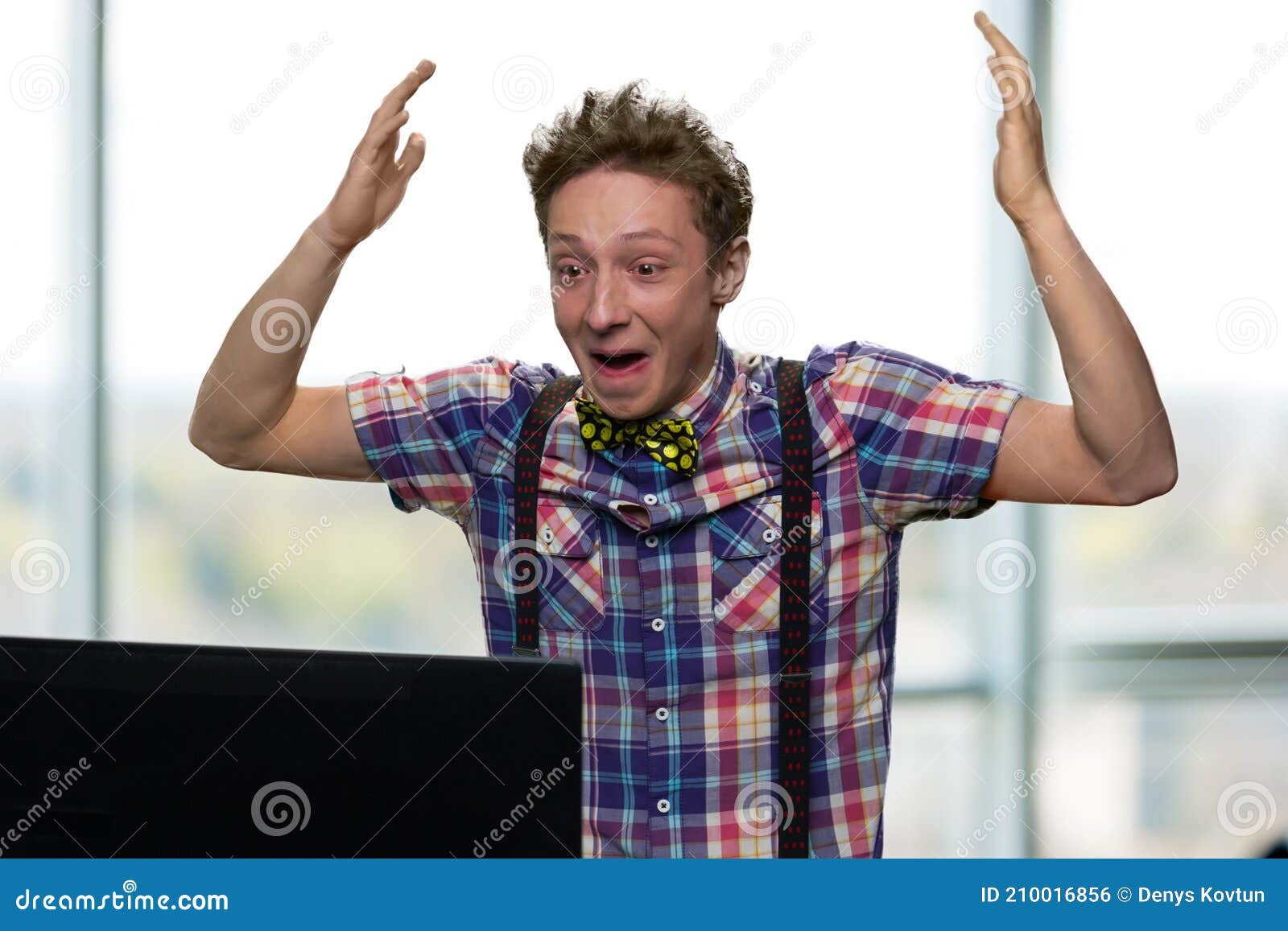 Excited Boy is Looking at the Computer. Stock Photo - Image of ...