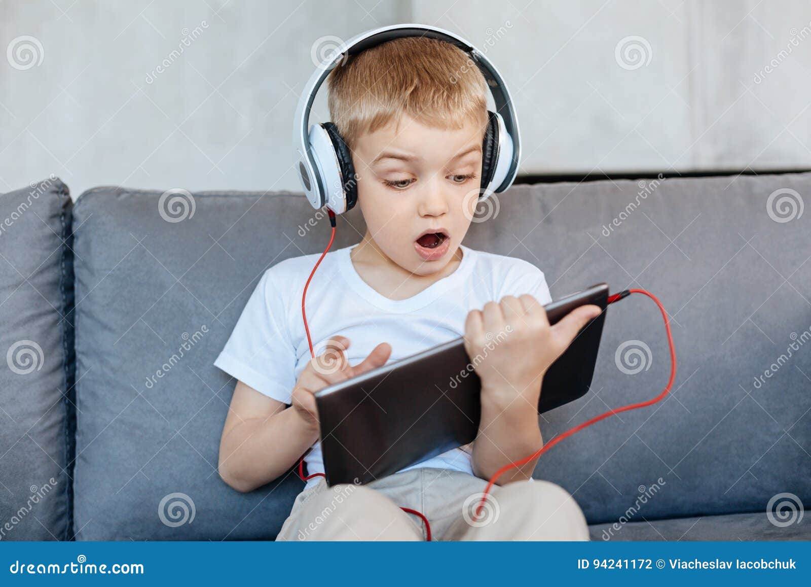 Excited Bright Boy Finding Something Interesting in the Internet Stock ...