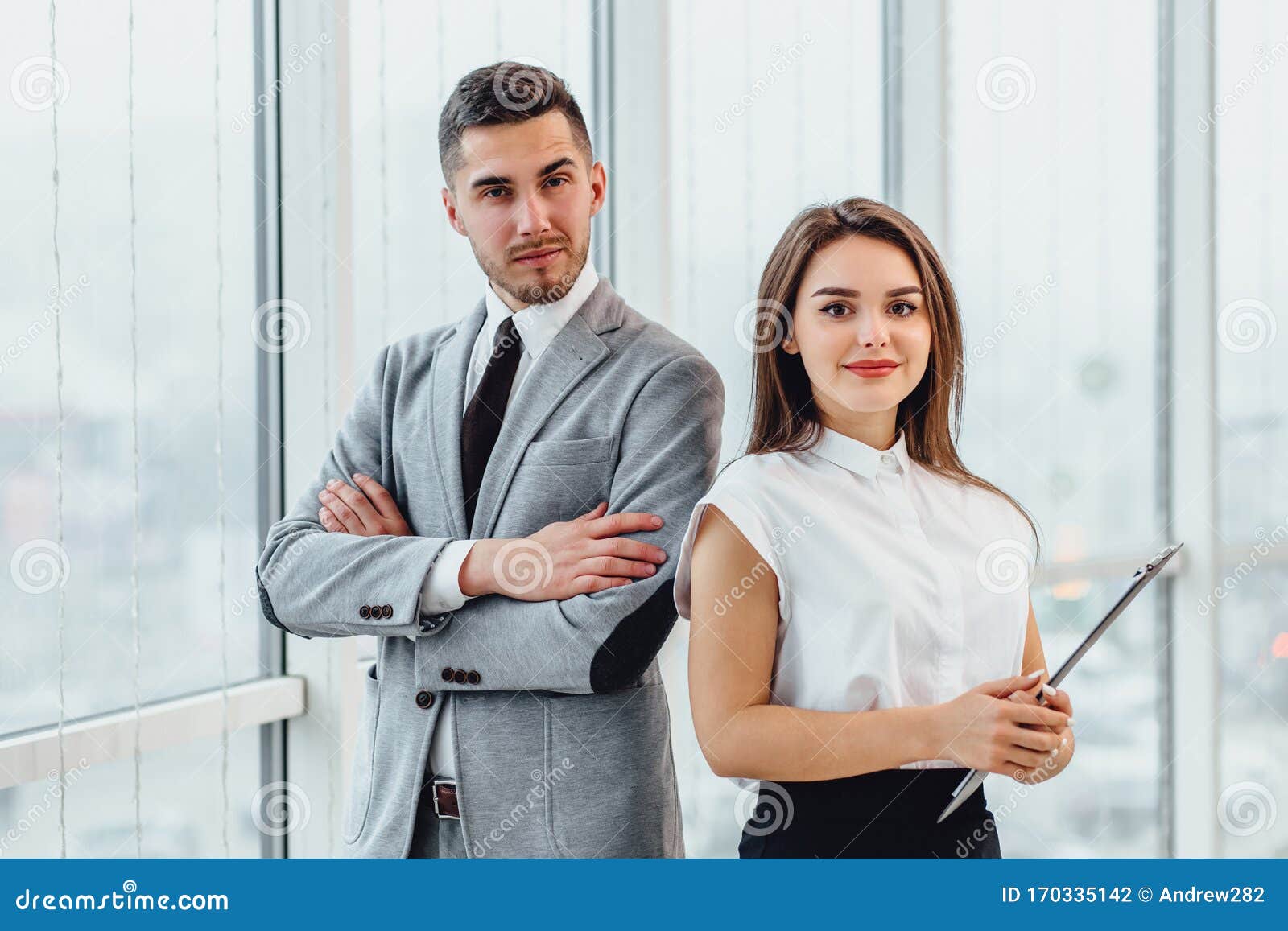 Excited Business Partners Standing Side by Side, Motivated for Better ... Excited Business Partners Standing Side by Side, Motivated for Better ...