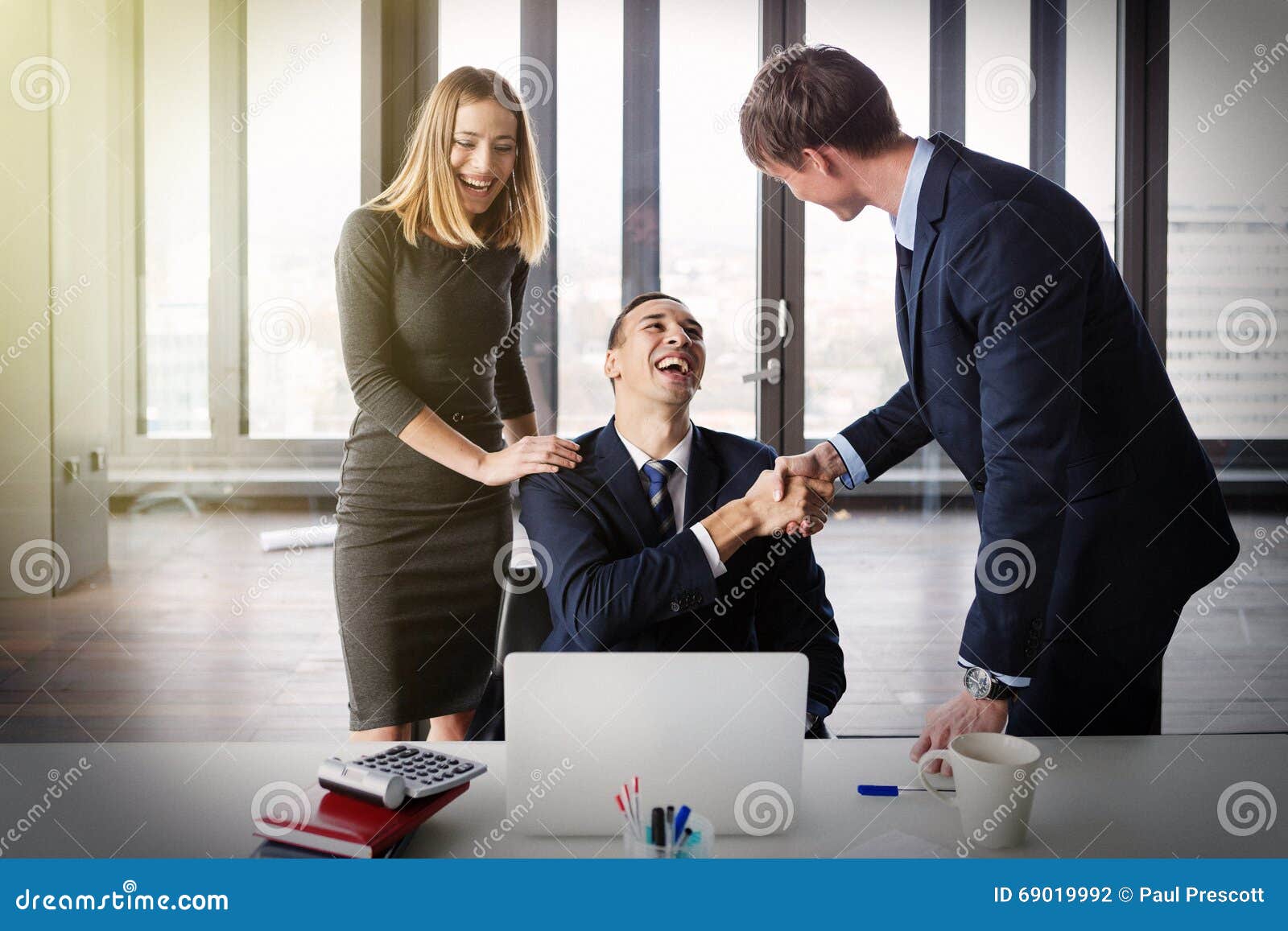 Excited Business People in Modern Office Working on Project Stock Photo ...