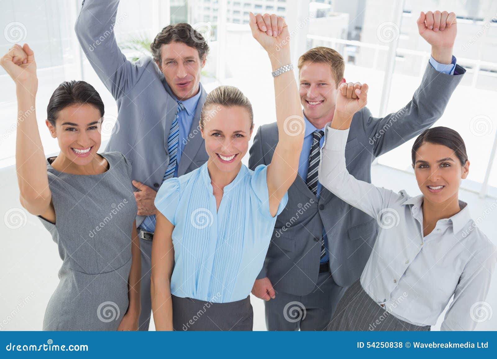 Excited Business Team Cheering at Camera Stock Photo - Image of male ...
