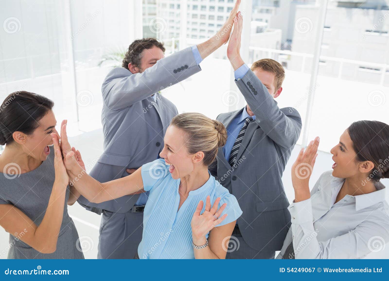 Excited Business Team Cheering Stock Image - Image of mature ...