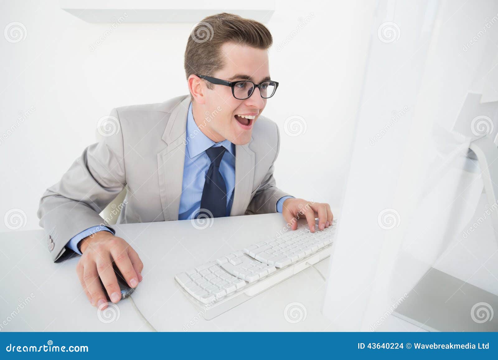 Excited Businessman Working on Computer Stock Photo - Image of male ...