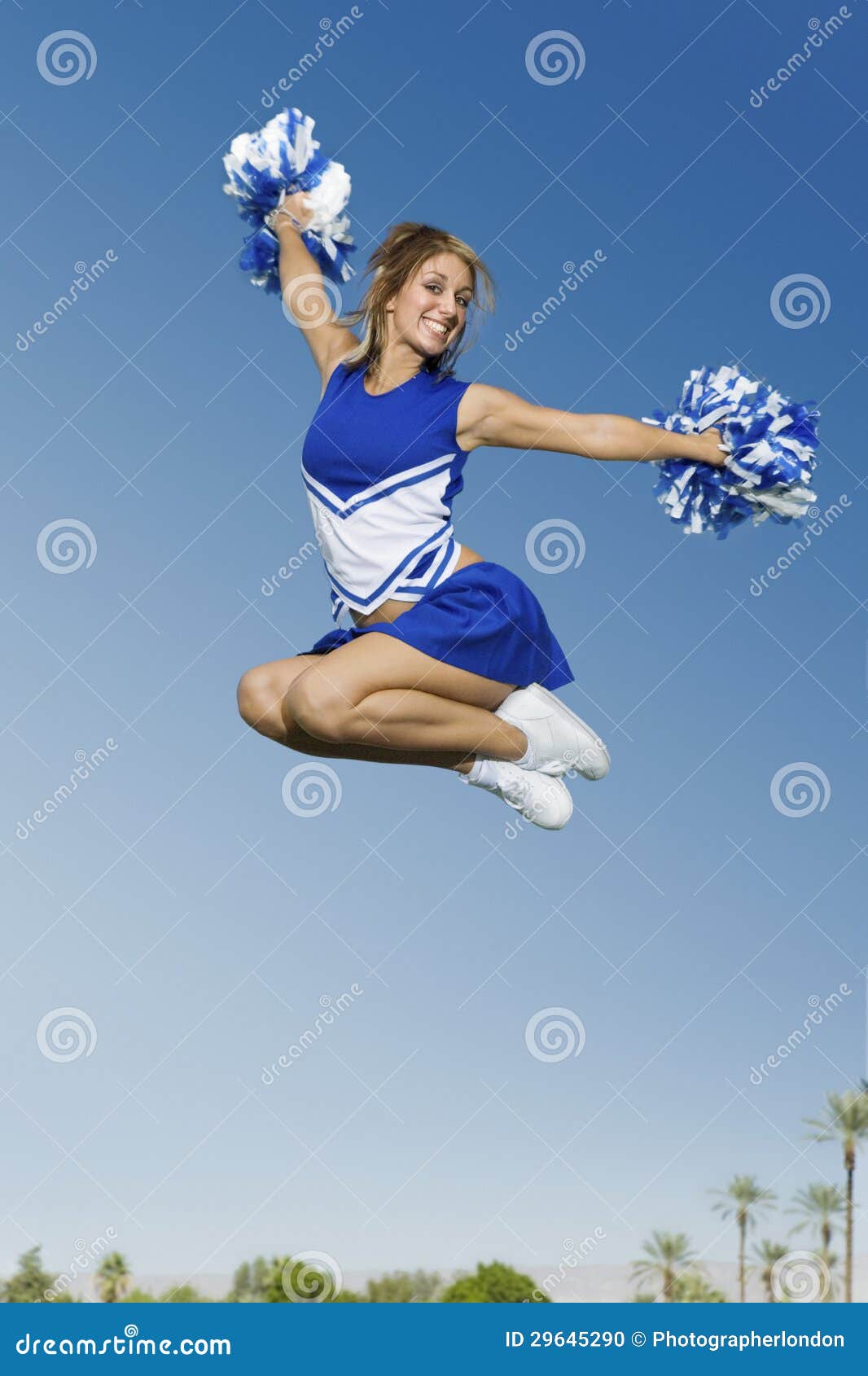 Excited Cheerleader Jumping Stock Photo - Image of attractive, midair ...