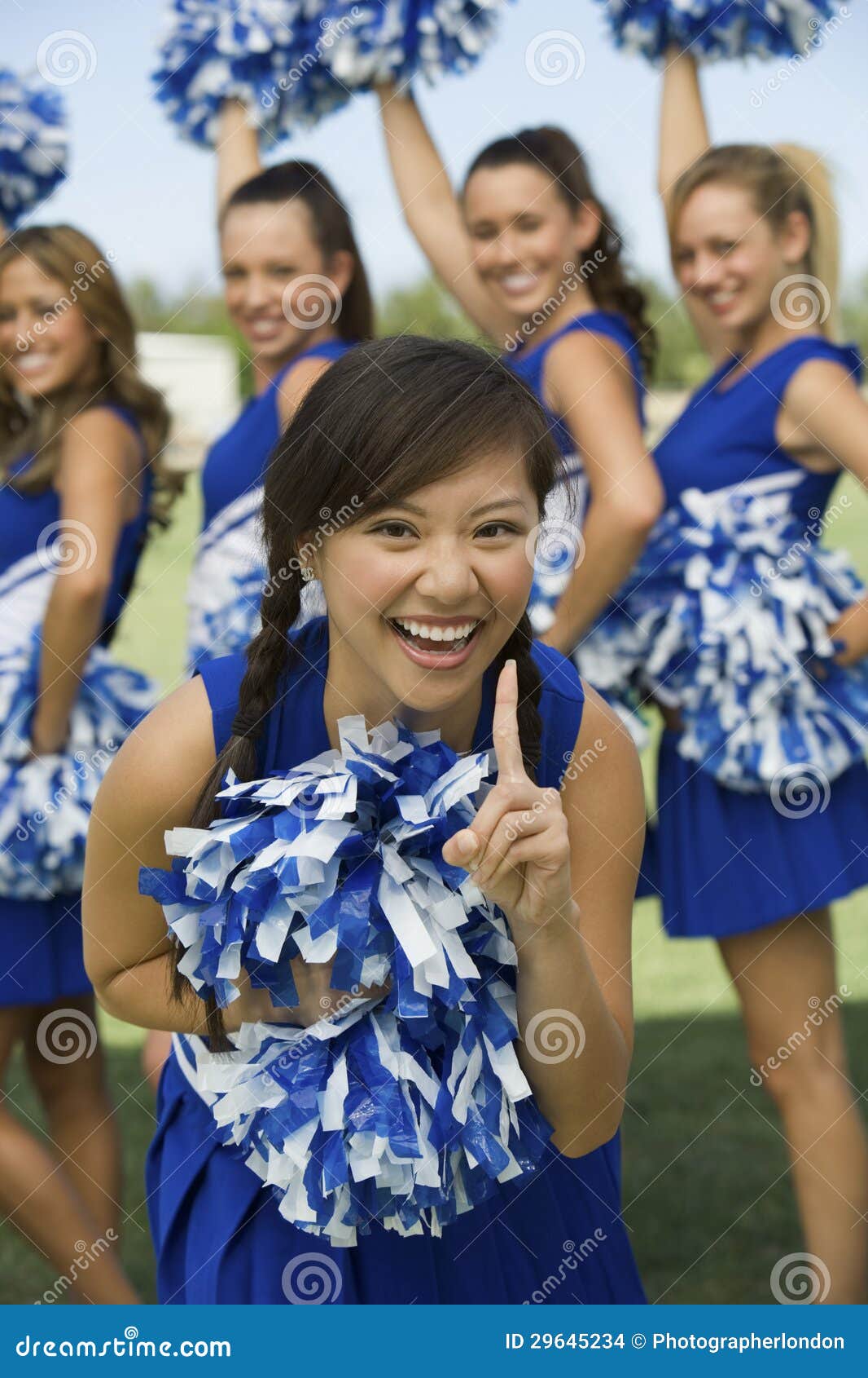 Excited Cheerleaders Cheering Stock Photo - Image of energetic, smile ...