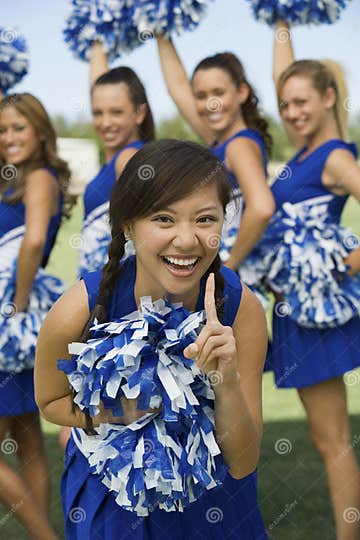Excited Cheerleaders Cheering Stock Photo - Image of energetic, smile ...