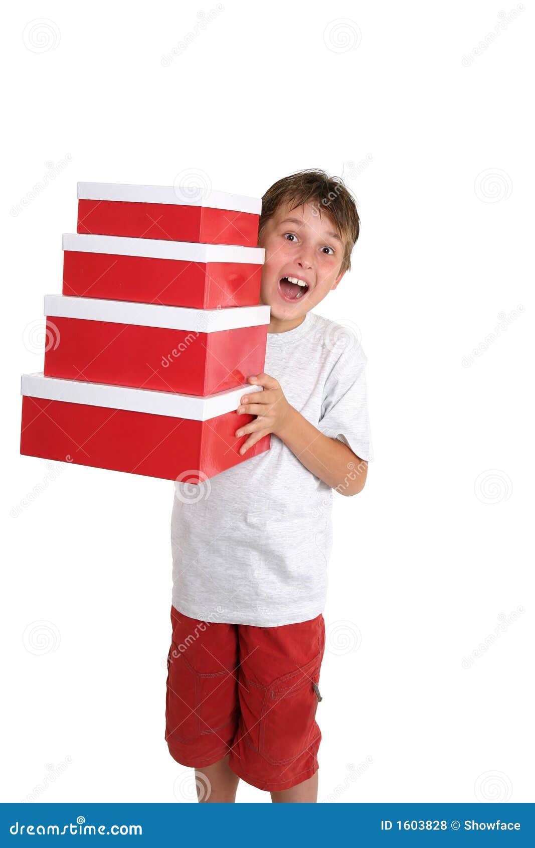 Excited Child Carrying Gift Boxes Stock Photo - Image of ltkidspics ...