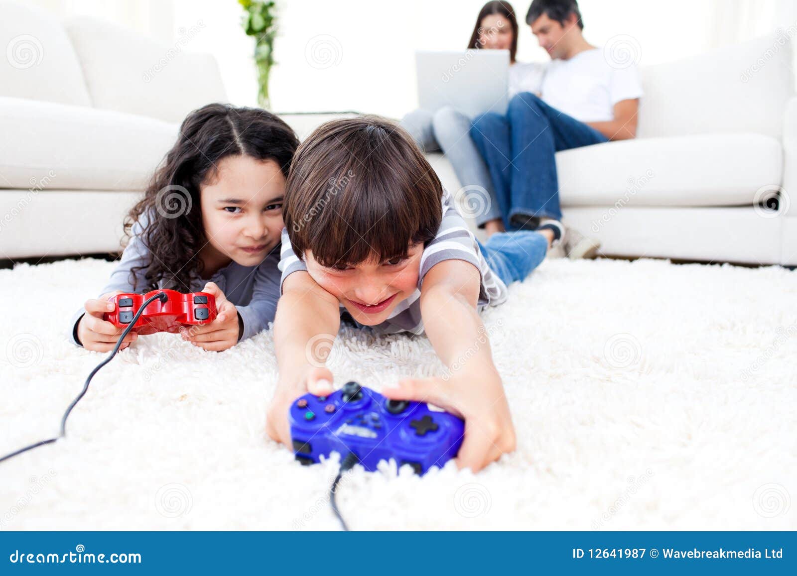 Excited Children Playing Video Games Stock Image - Image of living ...