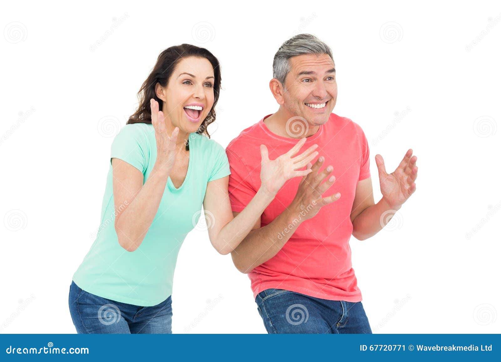 Excited couple cheering stock image. Image of smiling - 67720771