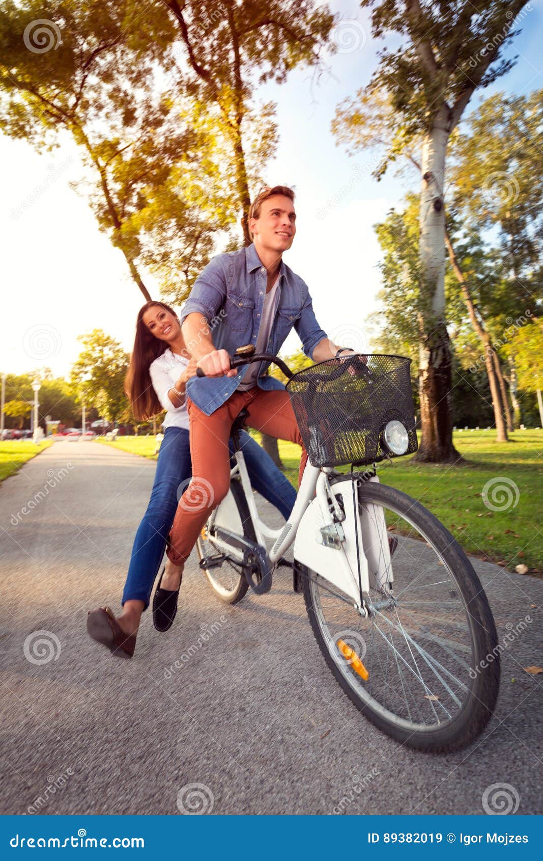 Excited Couple Enjoying Bicycle Ride Stock Image - Image of happy ...