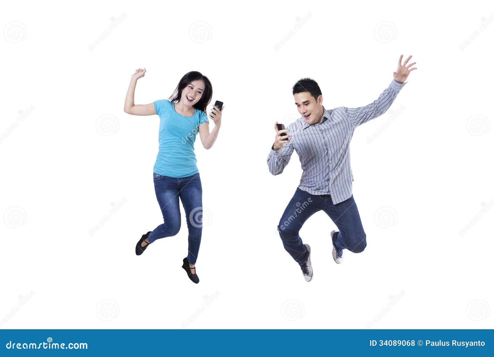 Excited Couple with Mobile Phone Stock Photo - Image of happiness ...