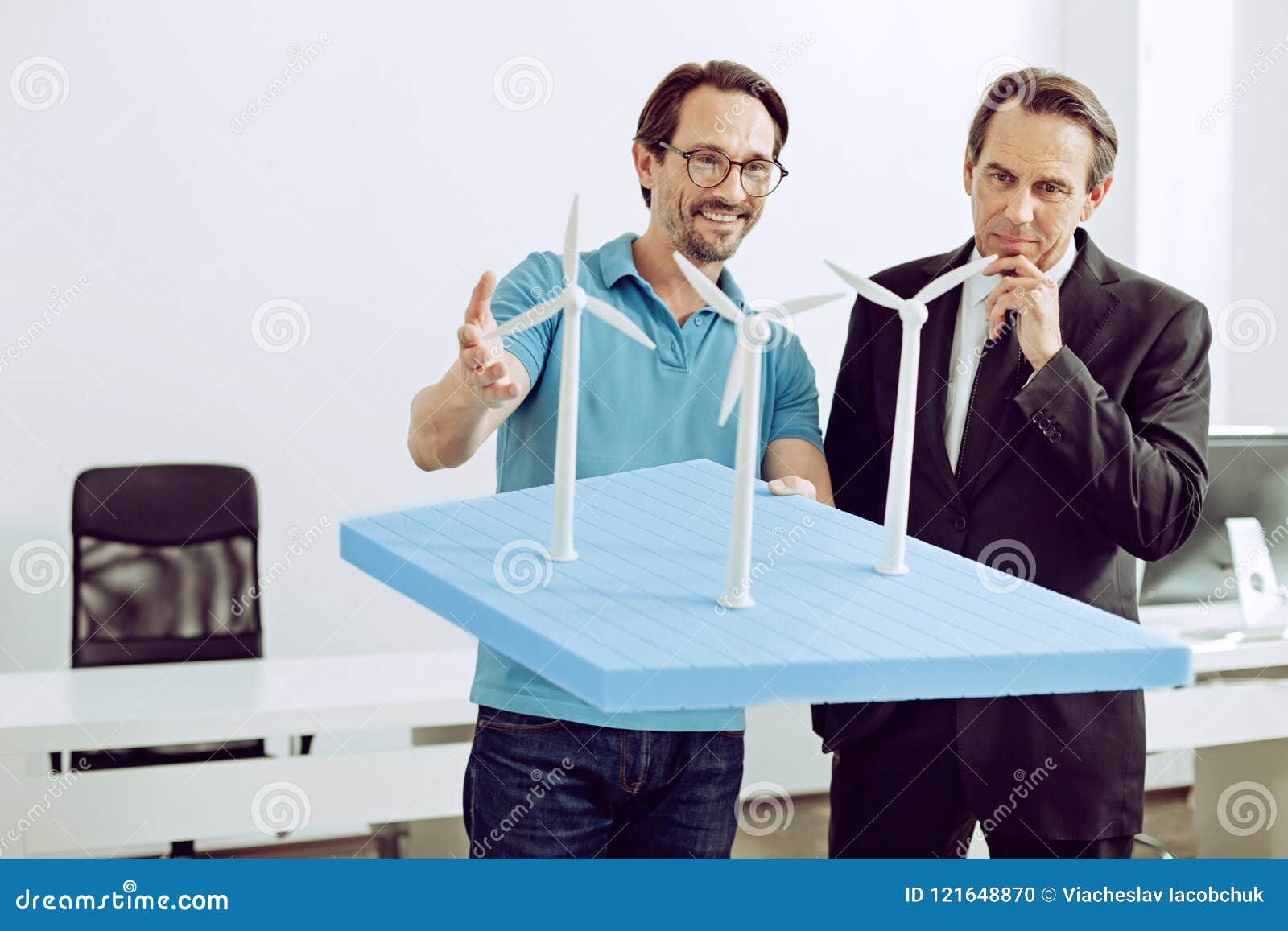 Excited Engineer Introducing His Model of Windmill Generators Stock ...