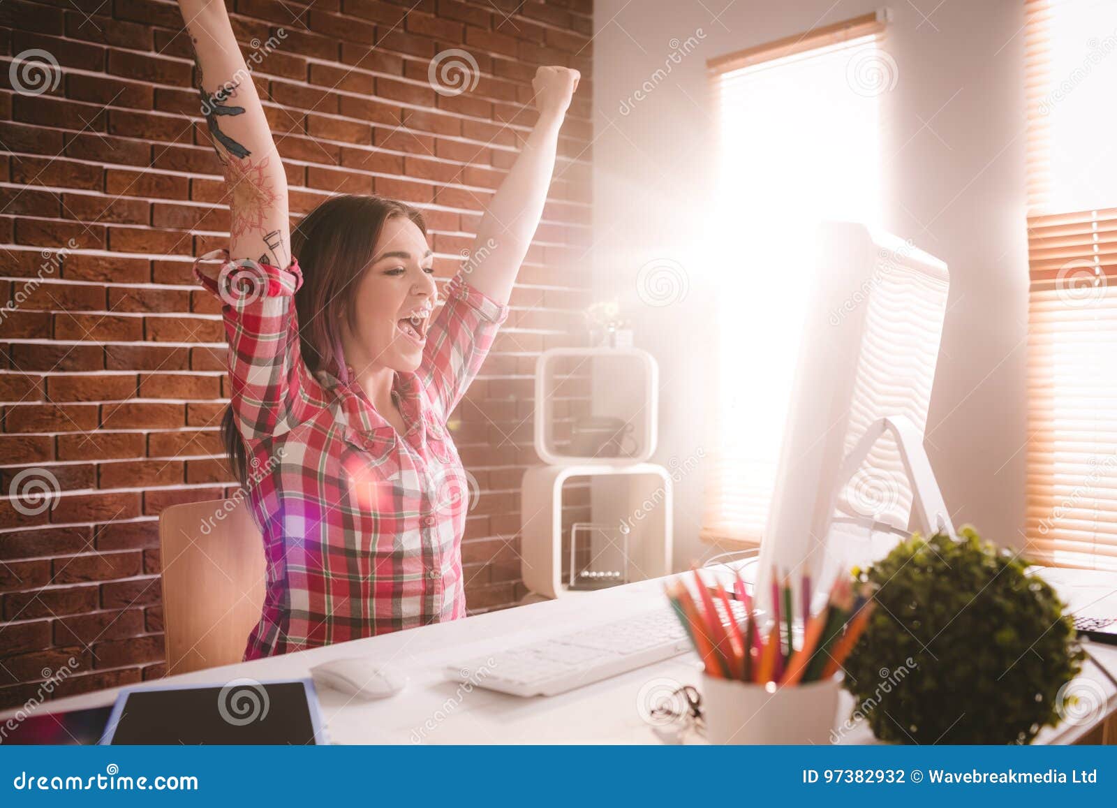 Excited Executive Using Desktop Computer in Office Stock Photo - Image ...