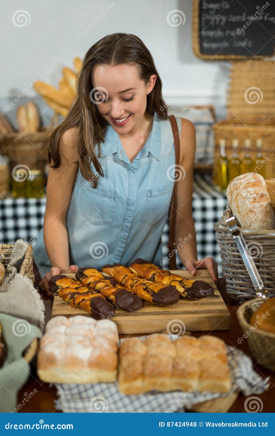 Excited Female Customer Looking at Tray of Dessert at Counter Stock ...
