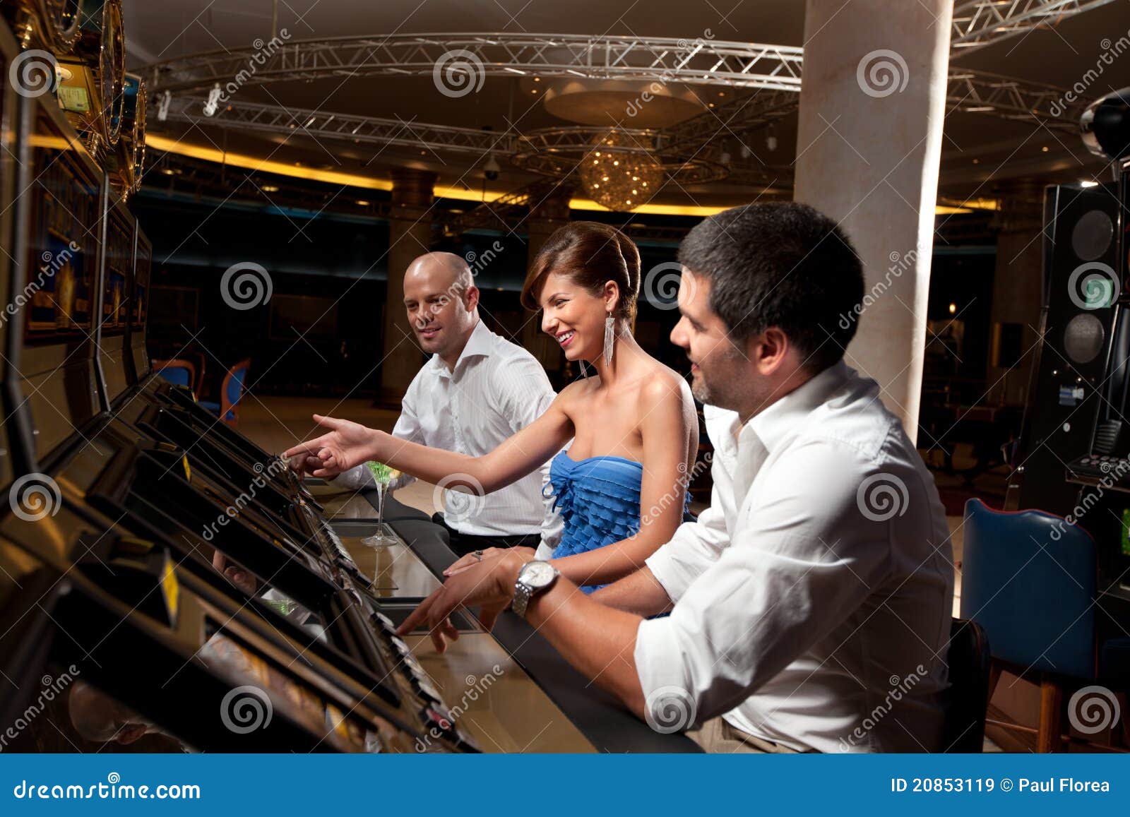 Excited Friends Playing at Gaming Machines Stock Image - Image of lucky ...