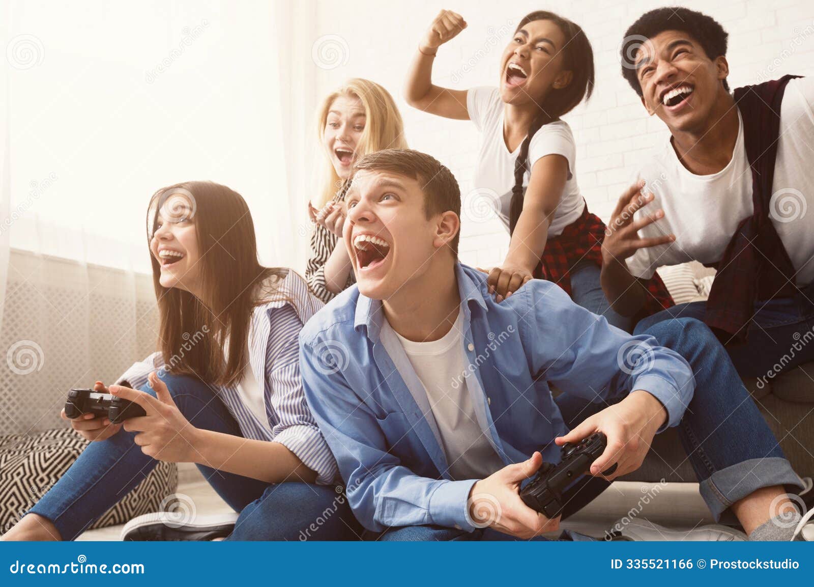 Excited Friends Playing Video Games at Home Stock Photo - Image of ...