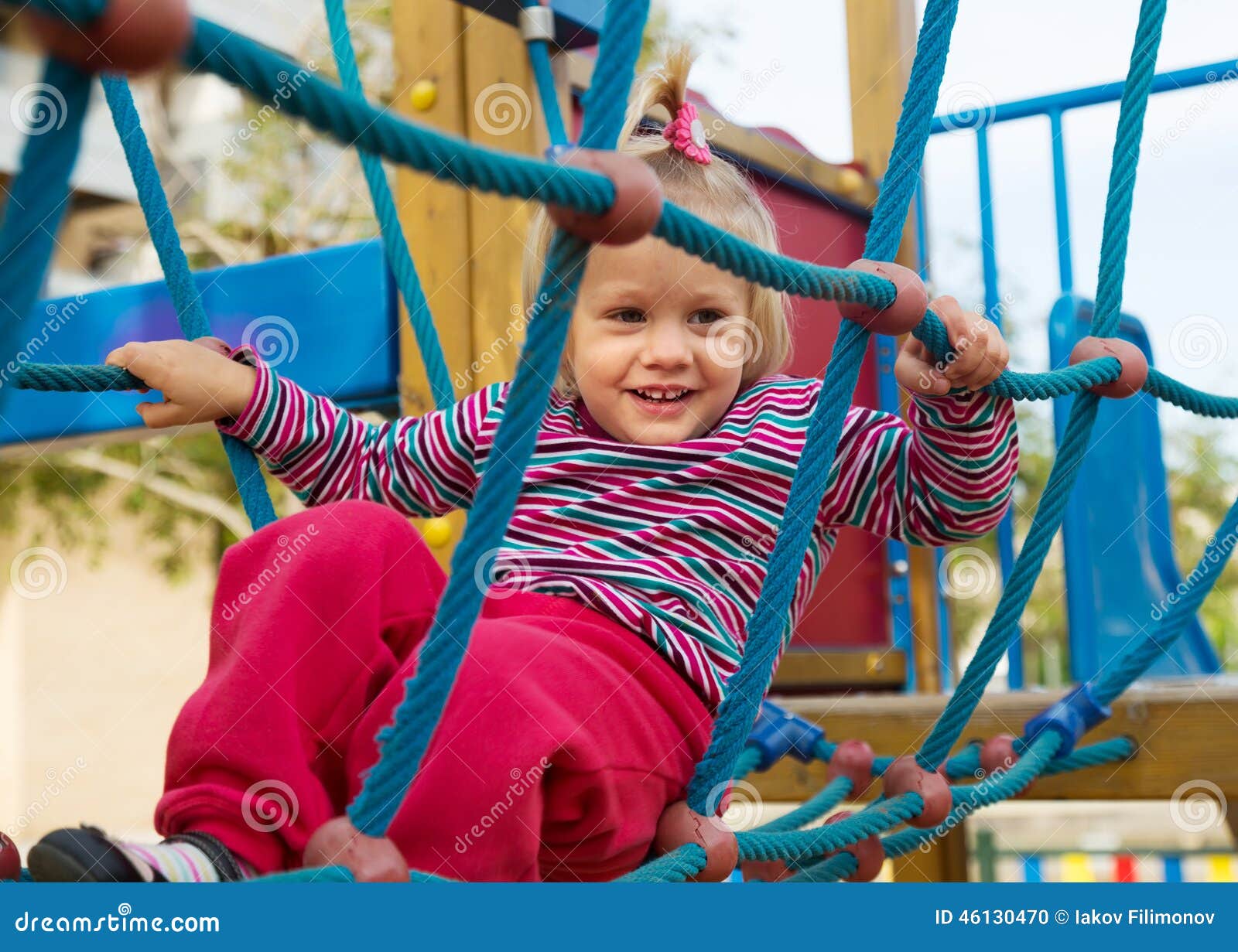 Excited Girl Developing Dexterity at Playground Stock Photo - Image of ...