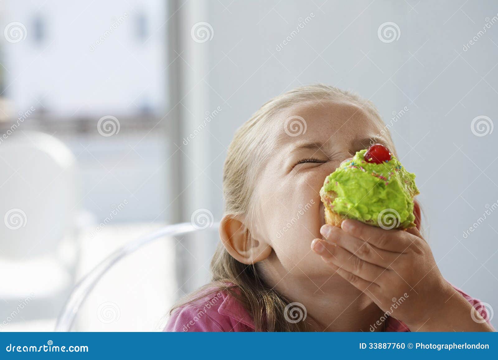 Excited Girl Eating Cupcake Stock Photo - Image of eating, childhood ...