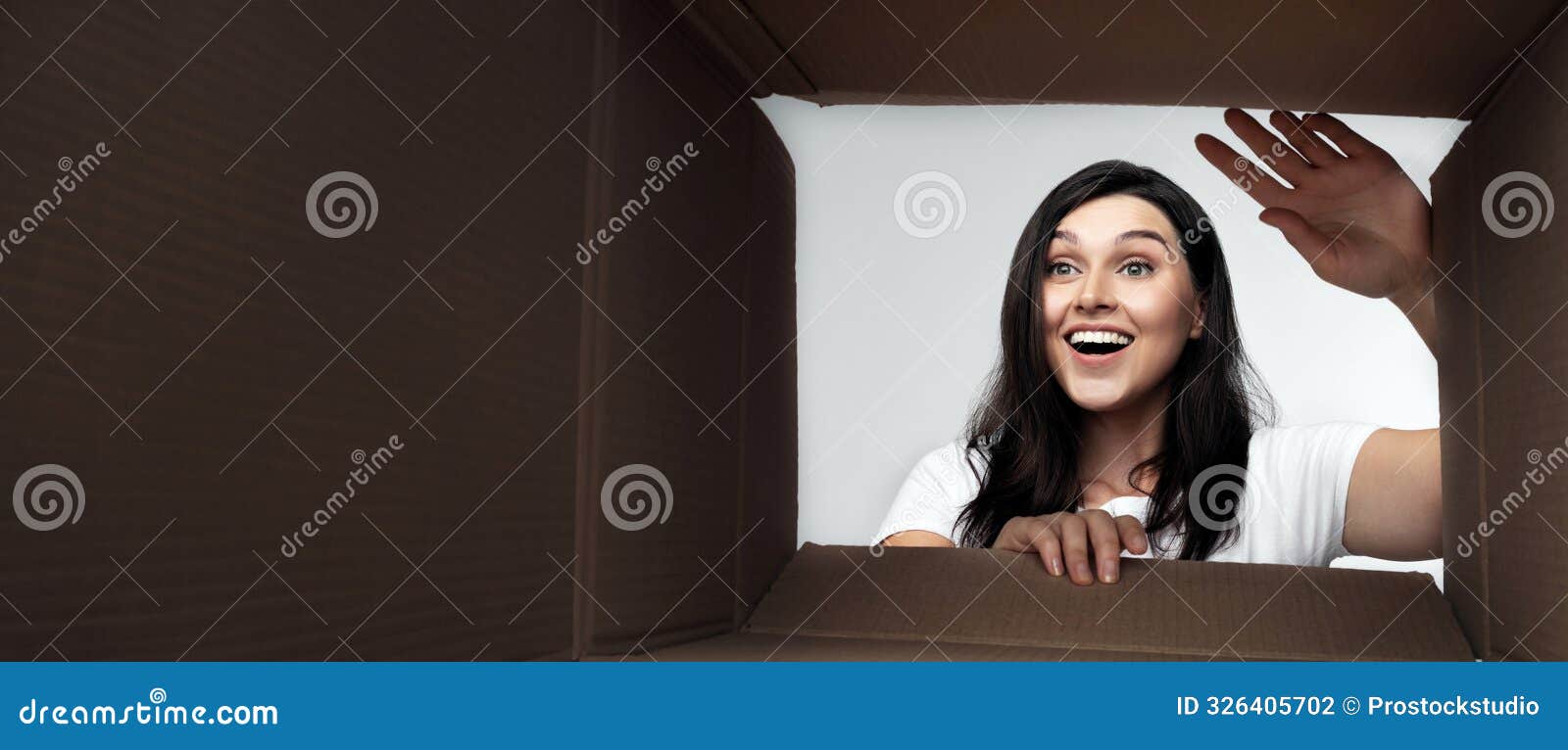 Excited Girl Looking Inside Empty Box, Bottom View Stock Photo - Image ...