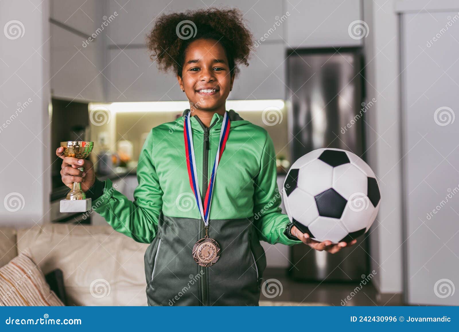 Girl with Medals and Trophy Cup Stock Photo - Image of league, champion ...
