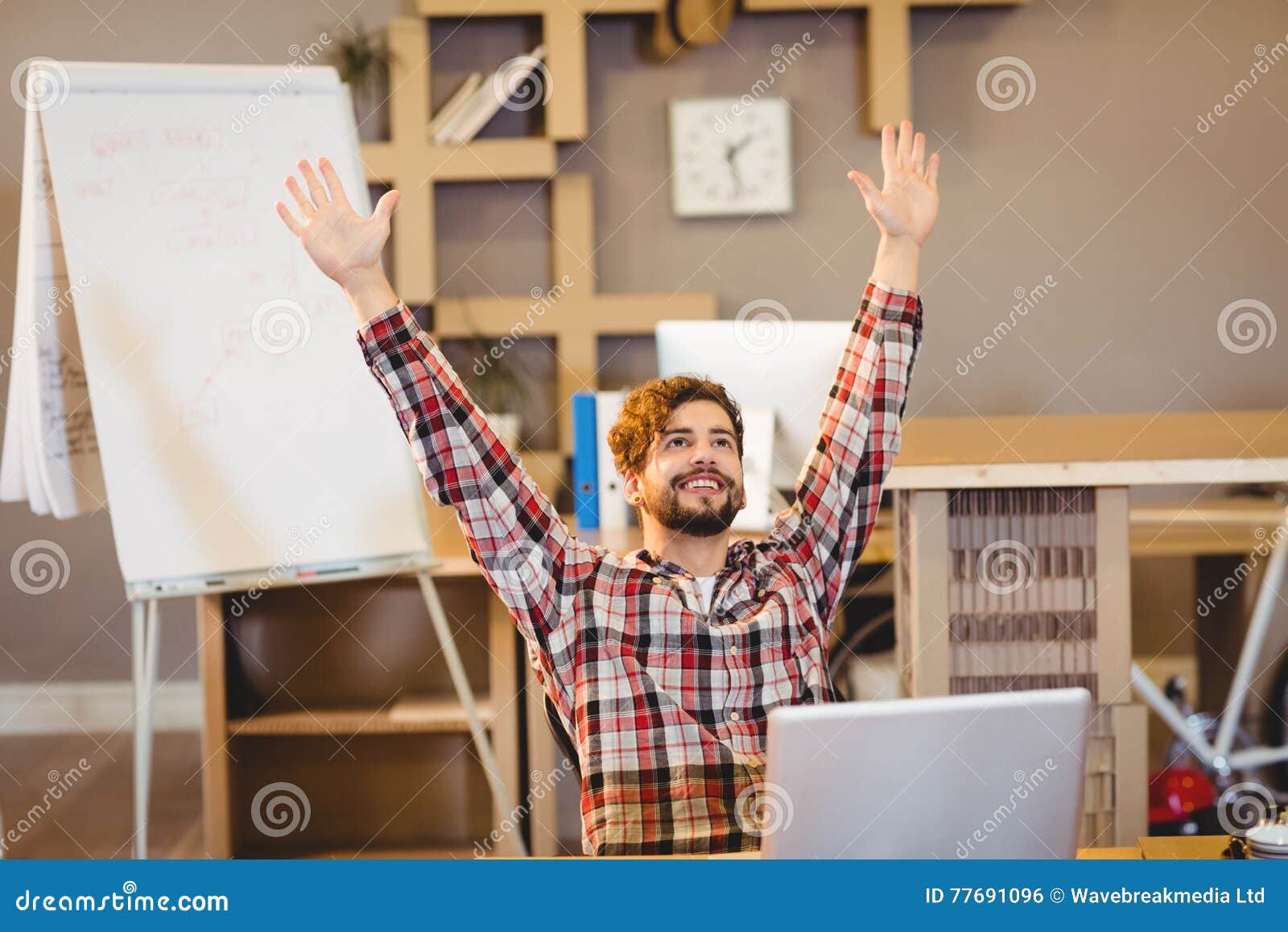 Excited Graphic Designer Sitting with Laptop Stock Photo - Image of ...