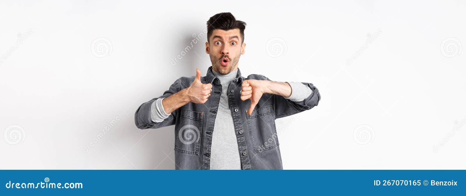 Excited Guy Show Thumbs Up and Down Judging and Making Decision, Rate ...