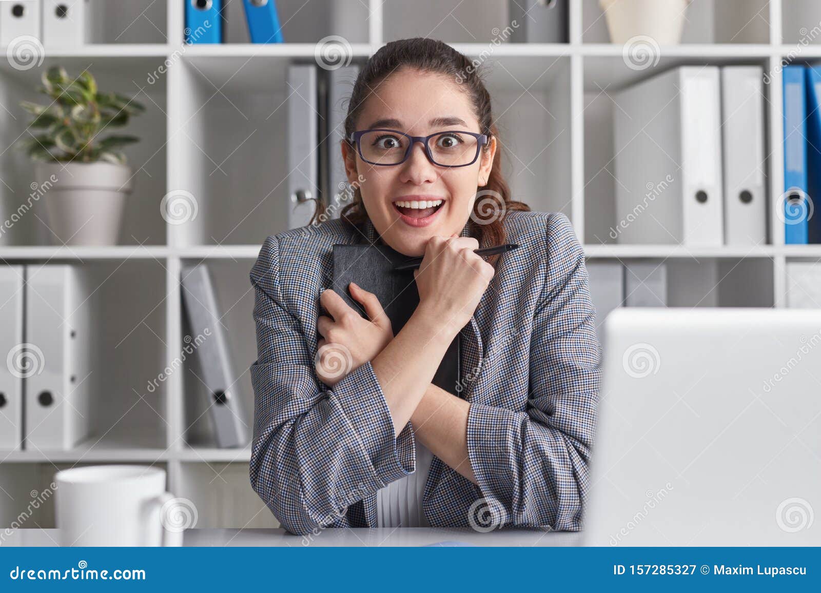 Excited Intern with Notebook in Office Stock Image - Image of ...