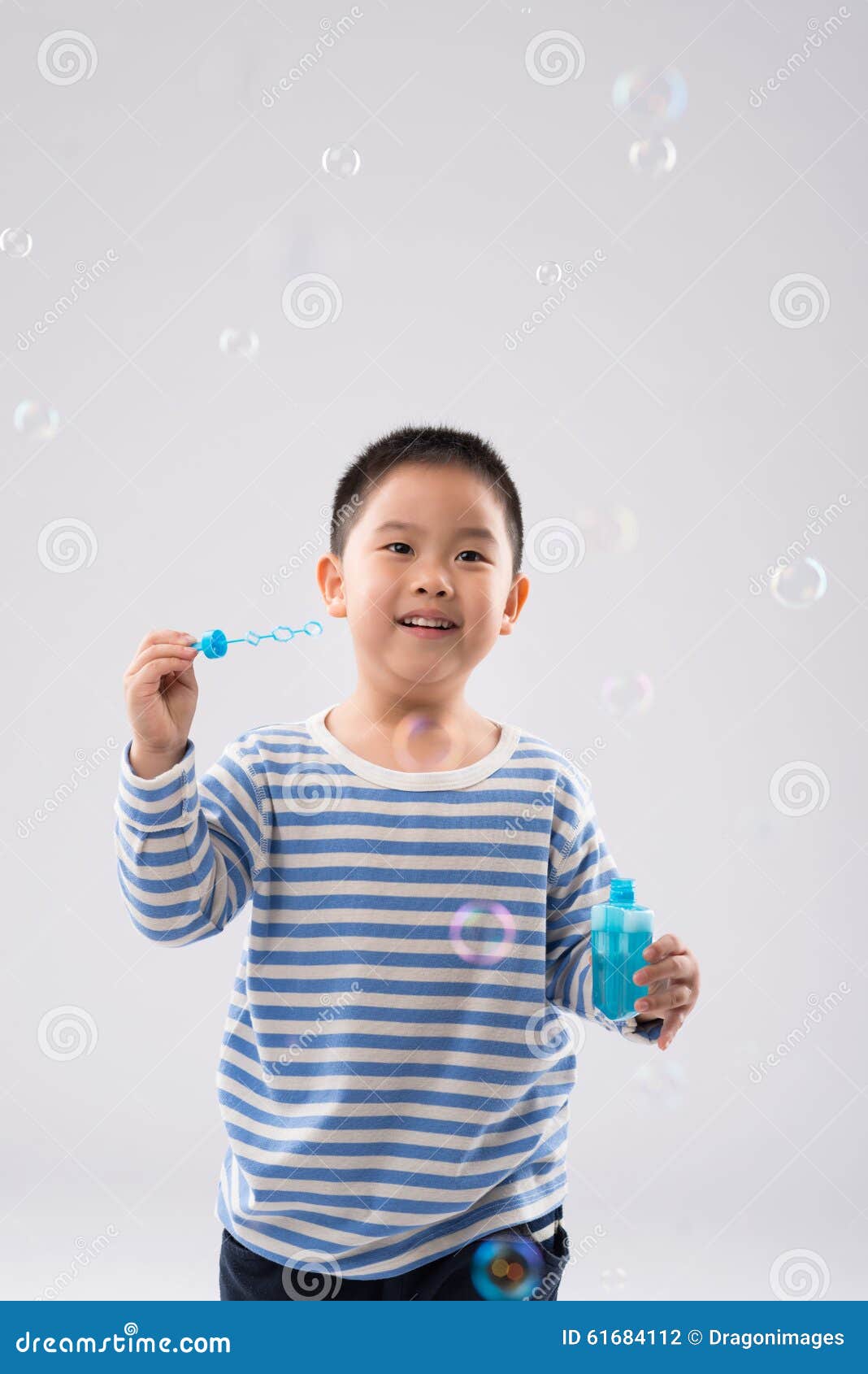 Excited kid stock photo. Image of portrait, child, grey - 61684112