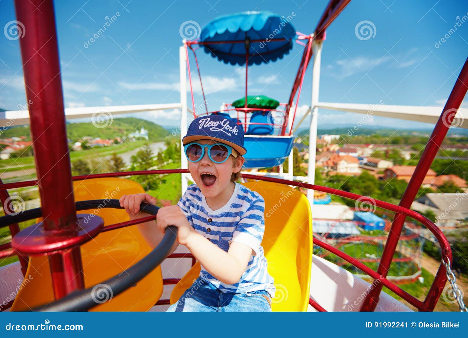 Excited Kid Riding on Ferris Wheel in Amusement Park Stock Image ...