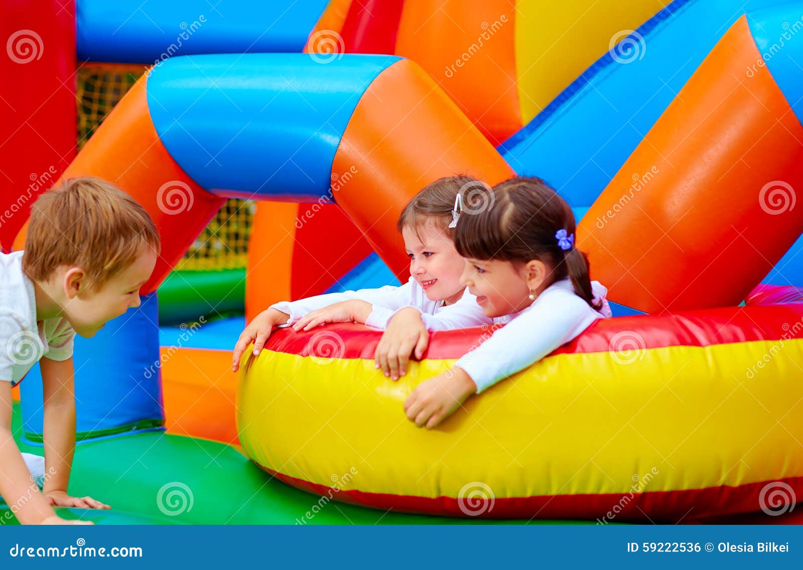 Excited Kids Having Fun on Inflatable Attraction Playground Stock Photo ...