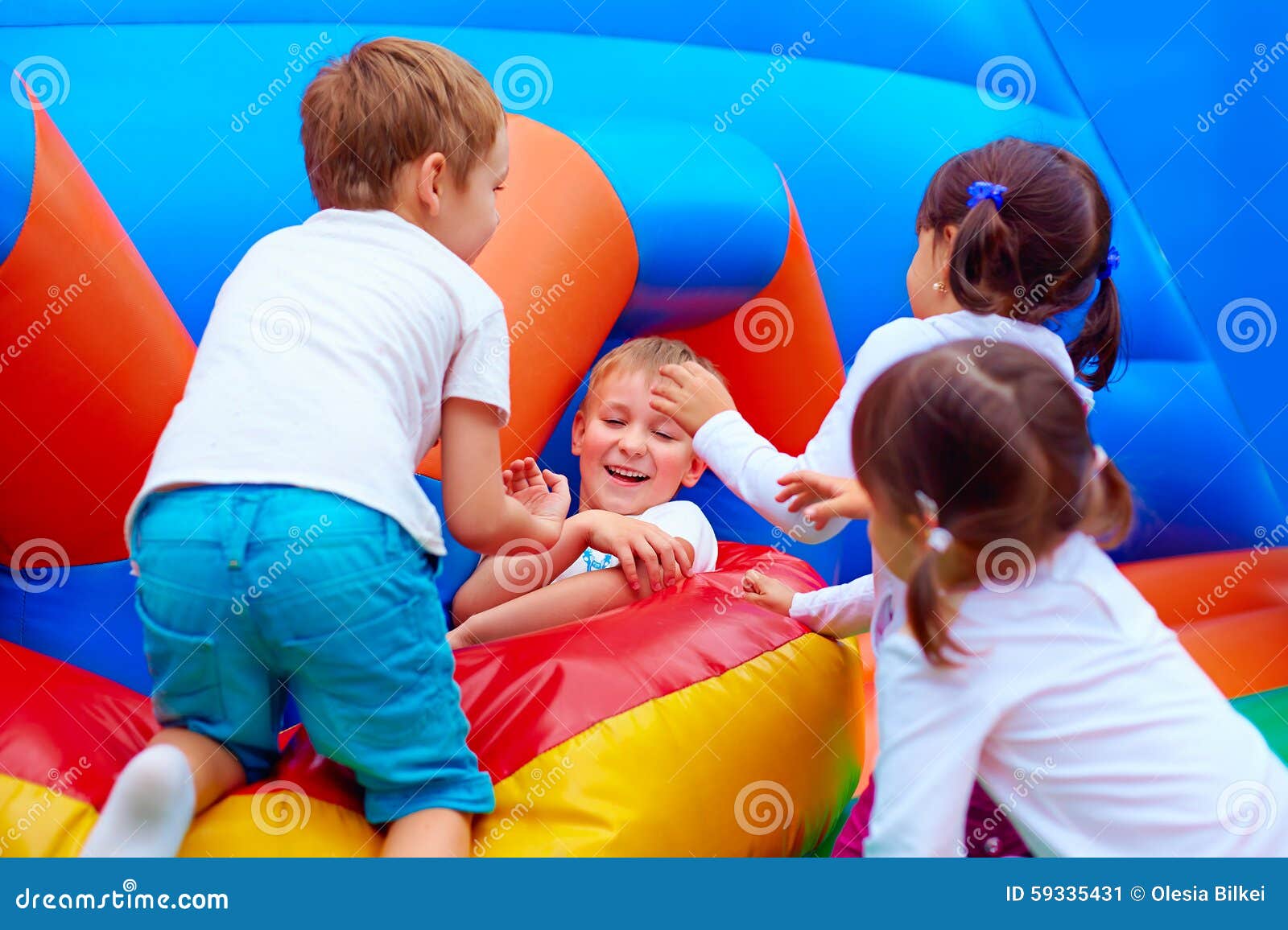 Excited Kids Having Fun on Inflatable Attraction Playground Stock Image ...