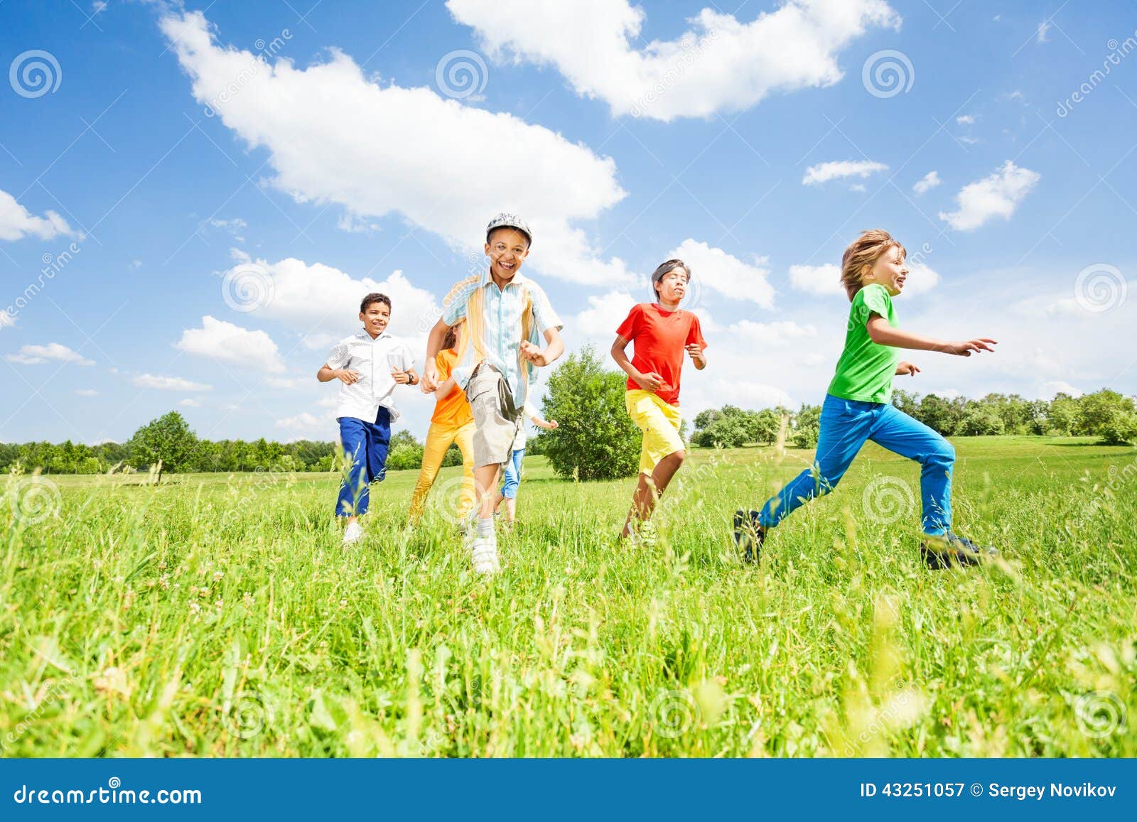 Excited Kids Playing and Running in the Field Stock Image - Image of ...