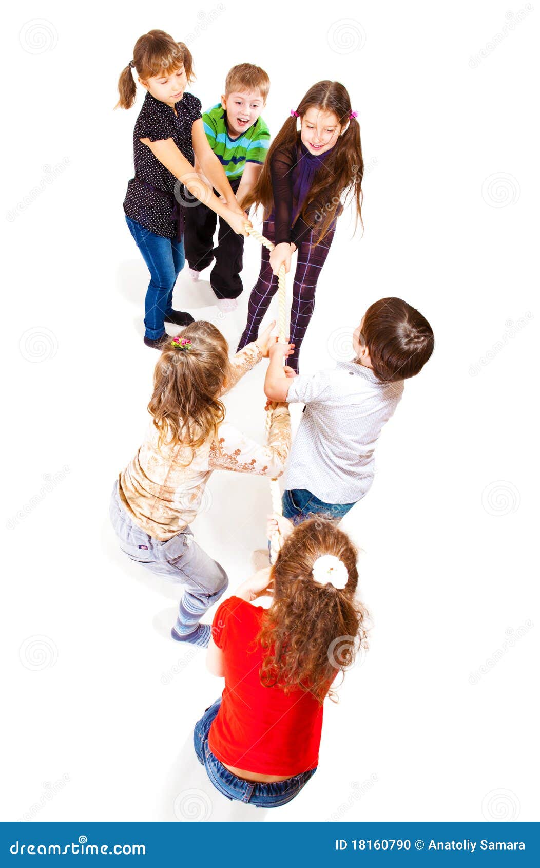 Excited kids pulling rope stock photo. Image of kids - 18160790