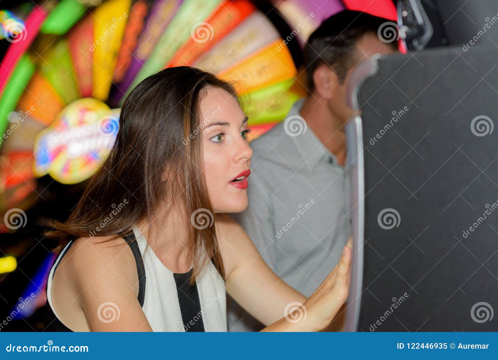 Excited Lady Playing Arcade Game Stock Image - Image of action, fortune ...