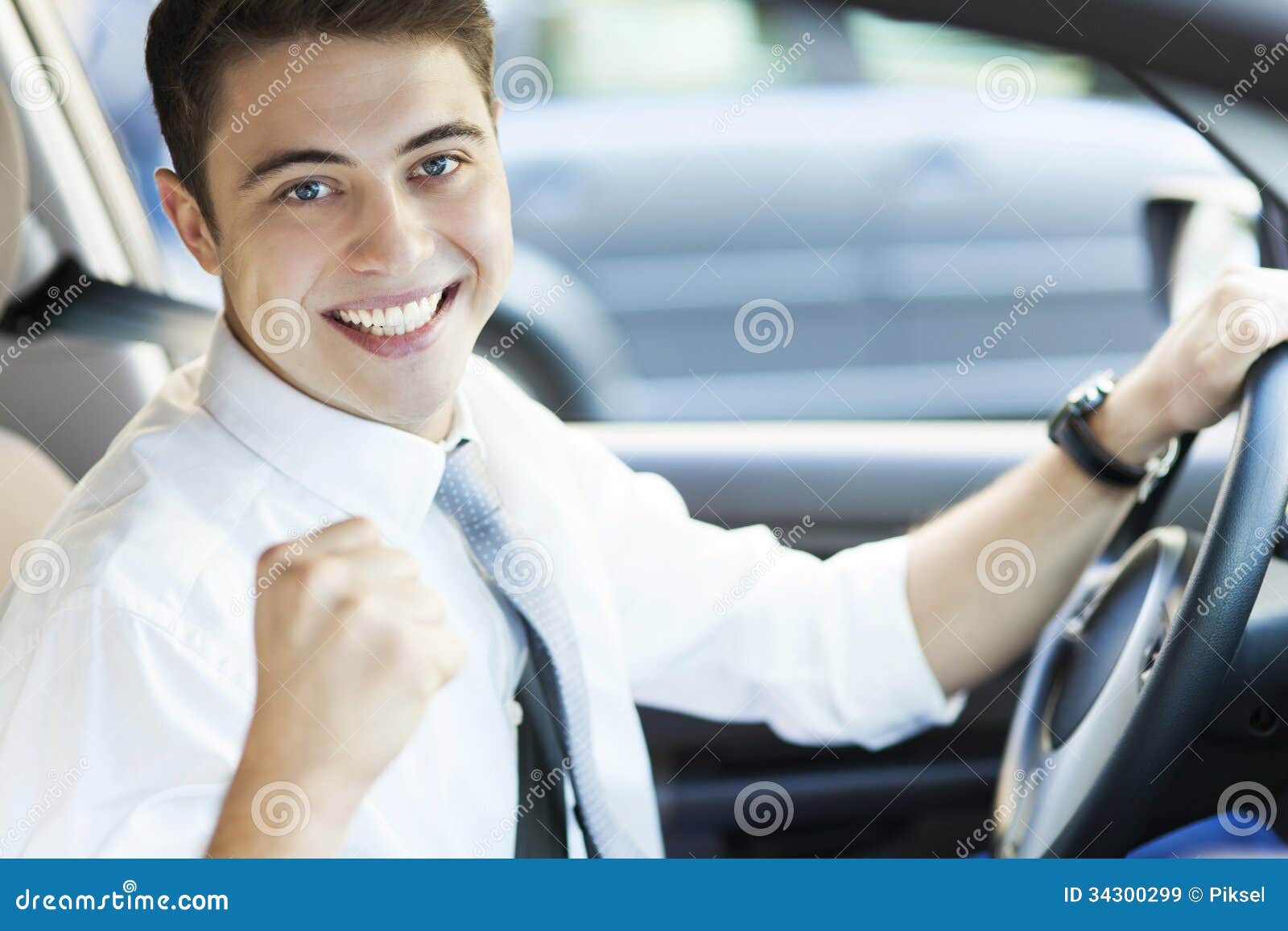 Excited man driving a car stock image. Image of driver - 34300299