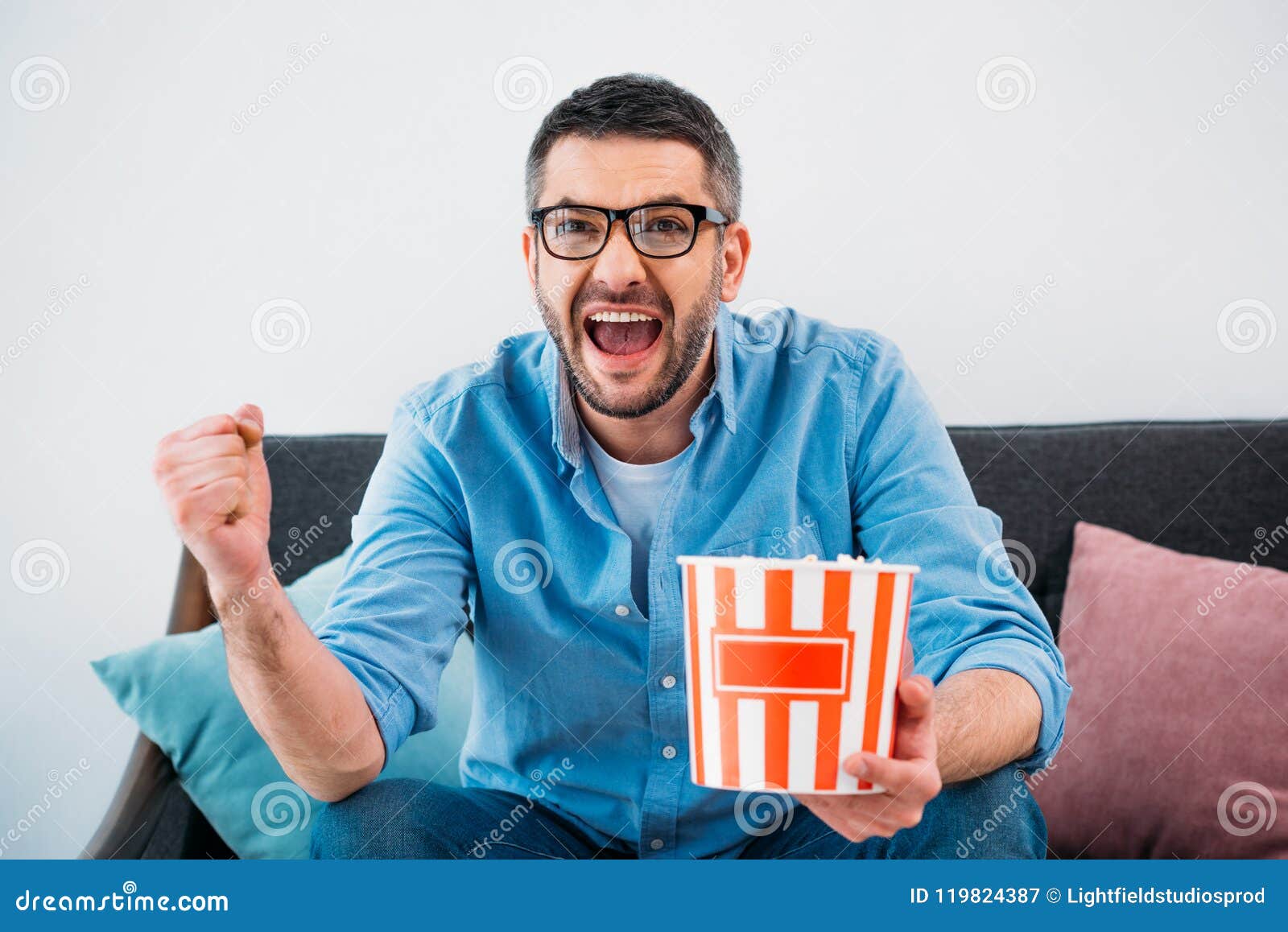 Excited Man with Popcorn Watching Tv Stock Image - Image of alone ...