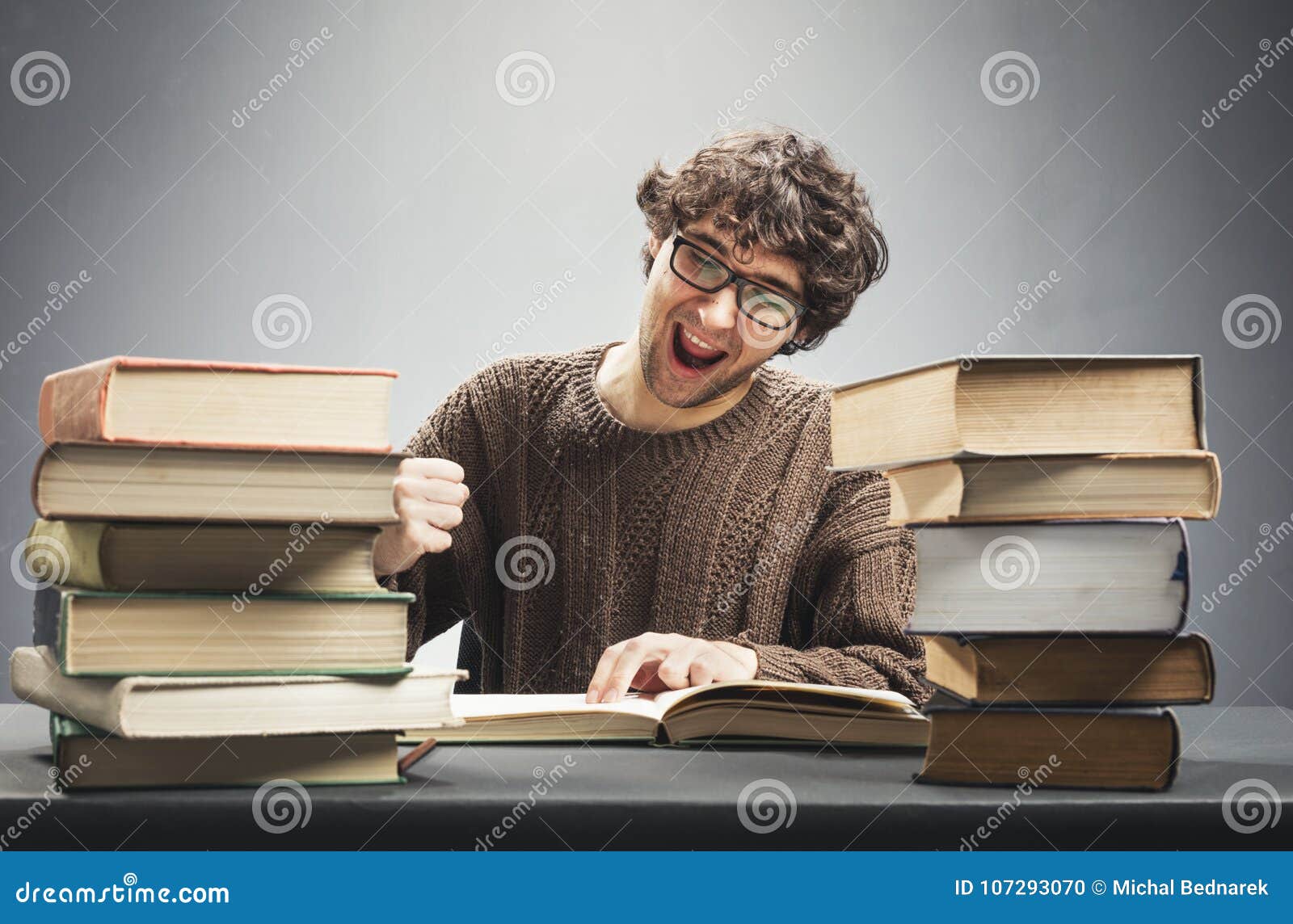 Excited Man Reading a Book, Studying Stock Photo - Image of pile ...
