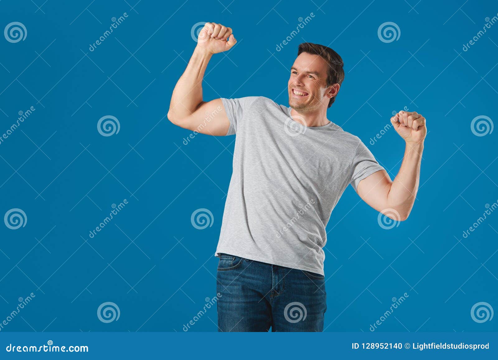 Excited Man Triumphing and Looking Away Stock Photo - Image of ...