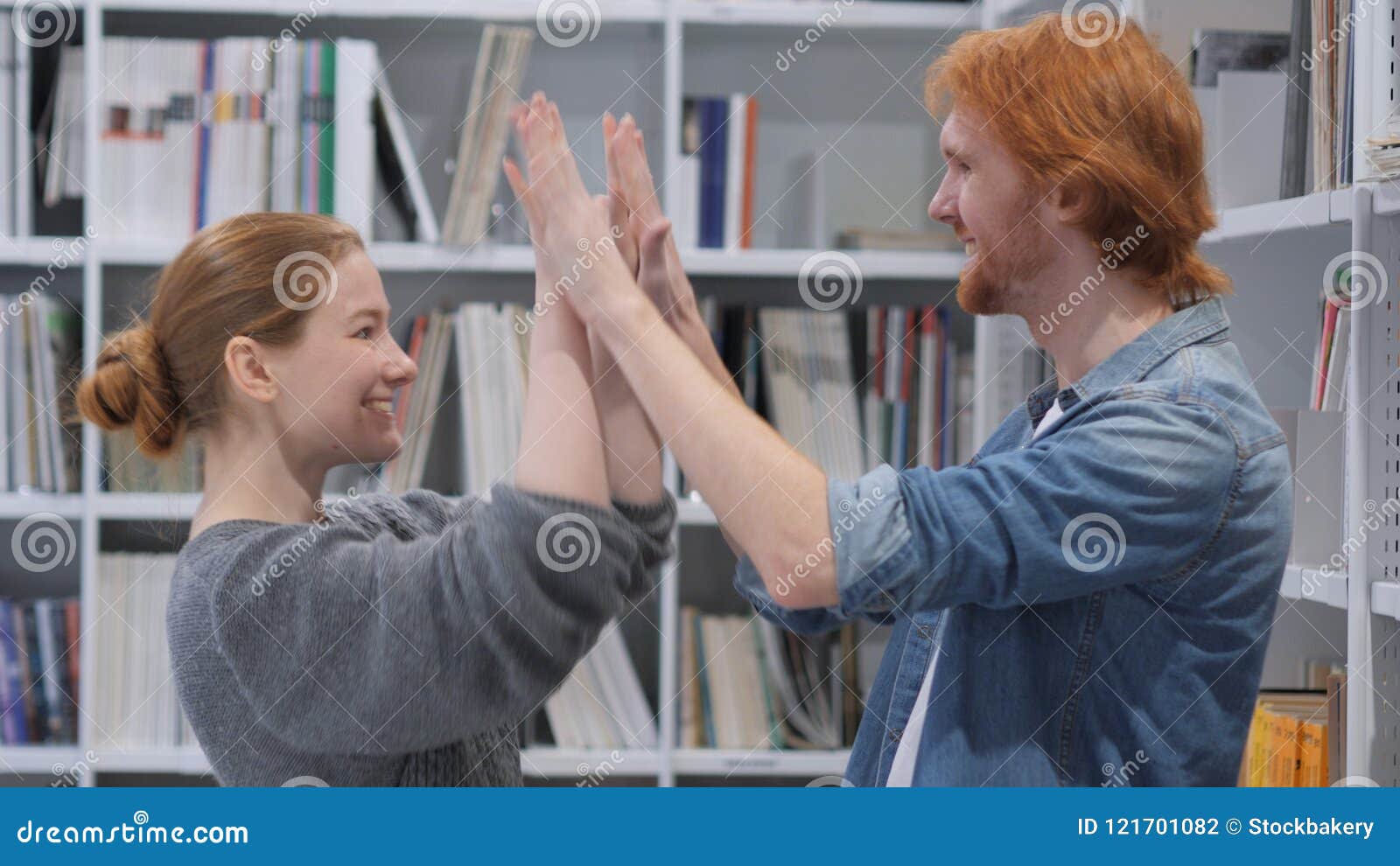 Excited Man and Woman Clapping with Eachother Stock Photo - Image of ...